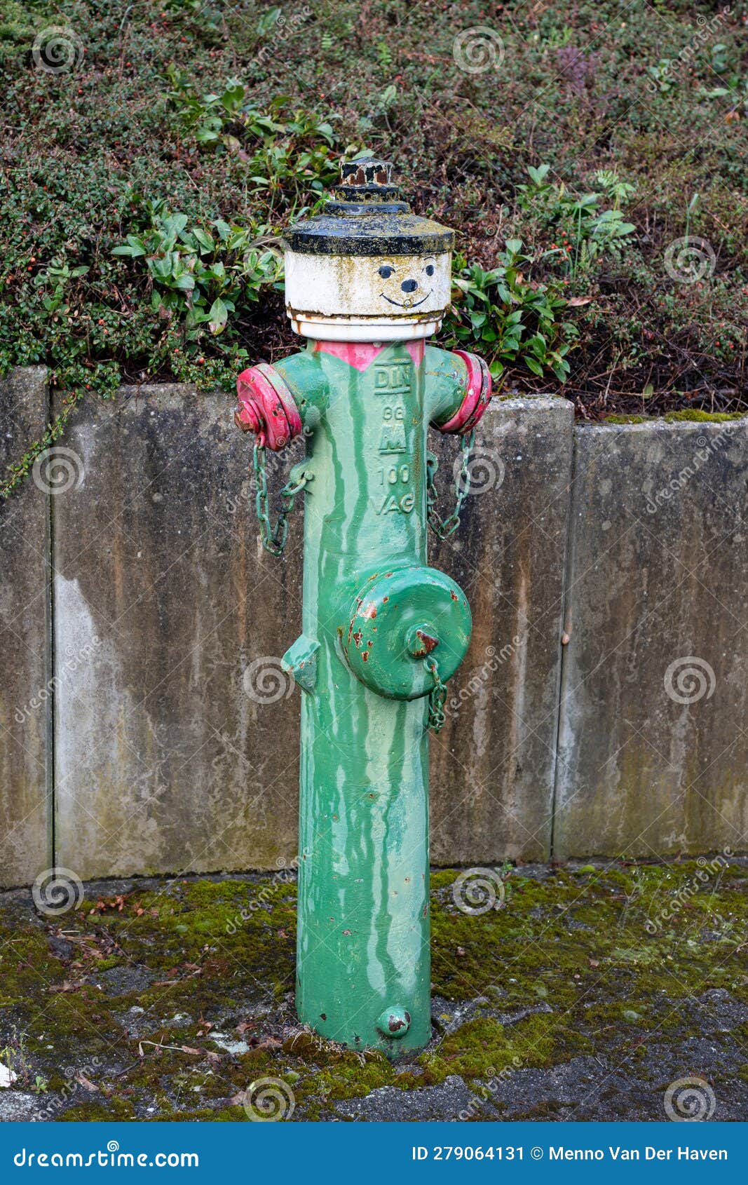 Green Fire Hydrant with Face Stock Image - Image of german, vintage ...