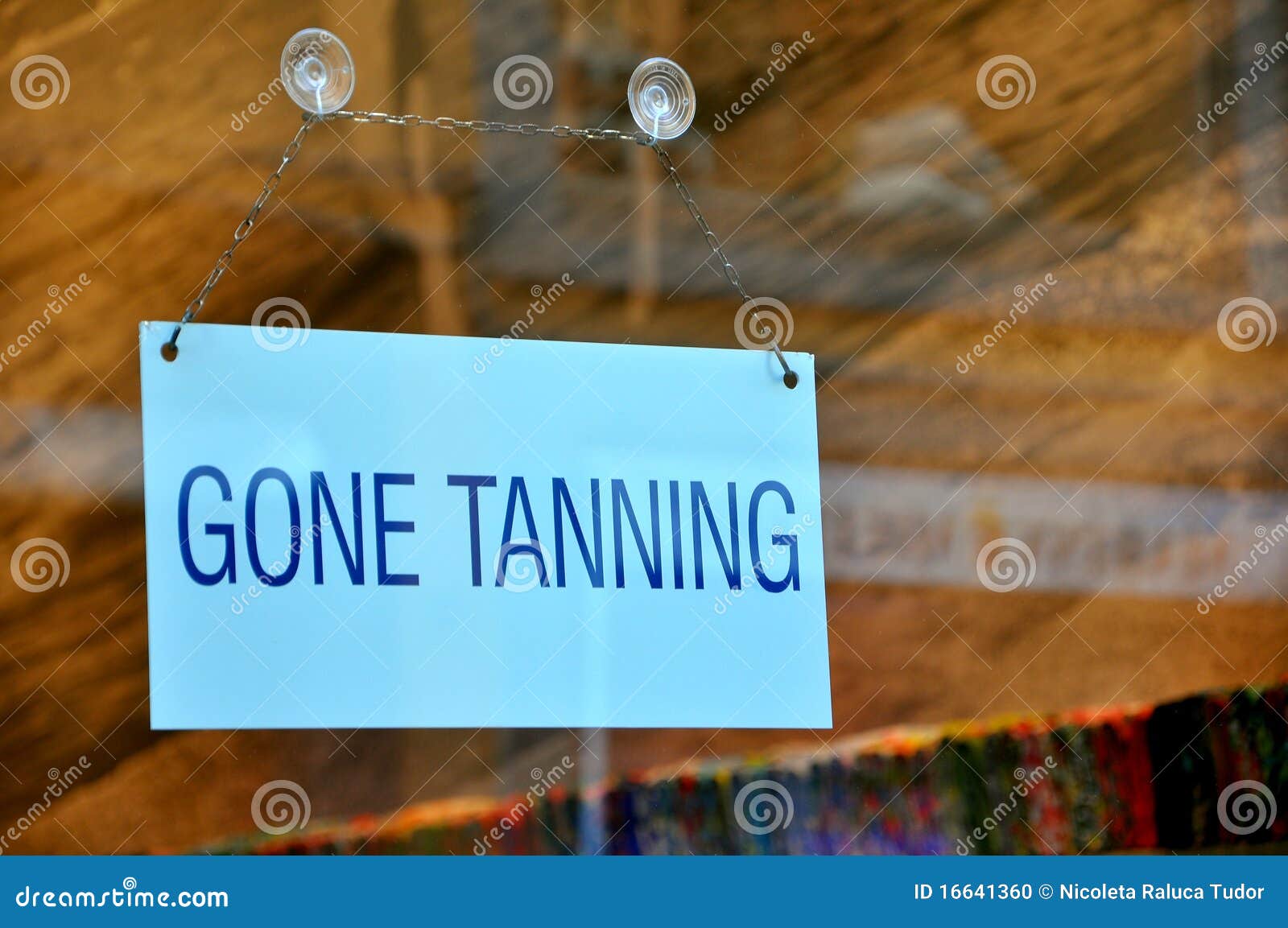 Funny sign: gone tanning stock photo. Image of beach - 16641360