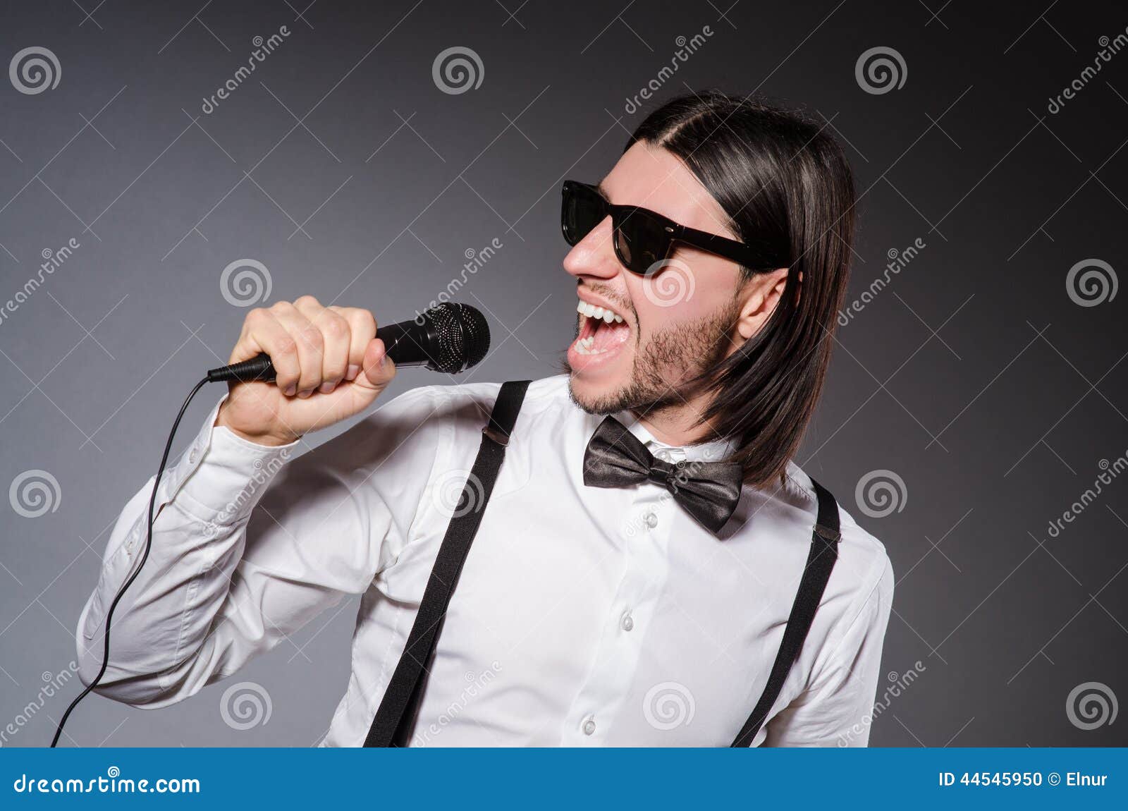 Funny Singer with Microphone Stock Photo - Image of live, karaoke: 44545950