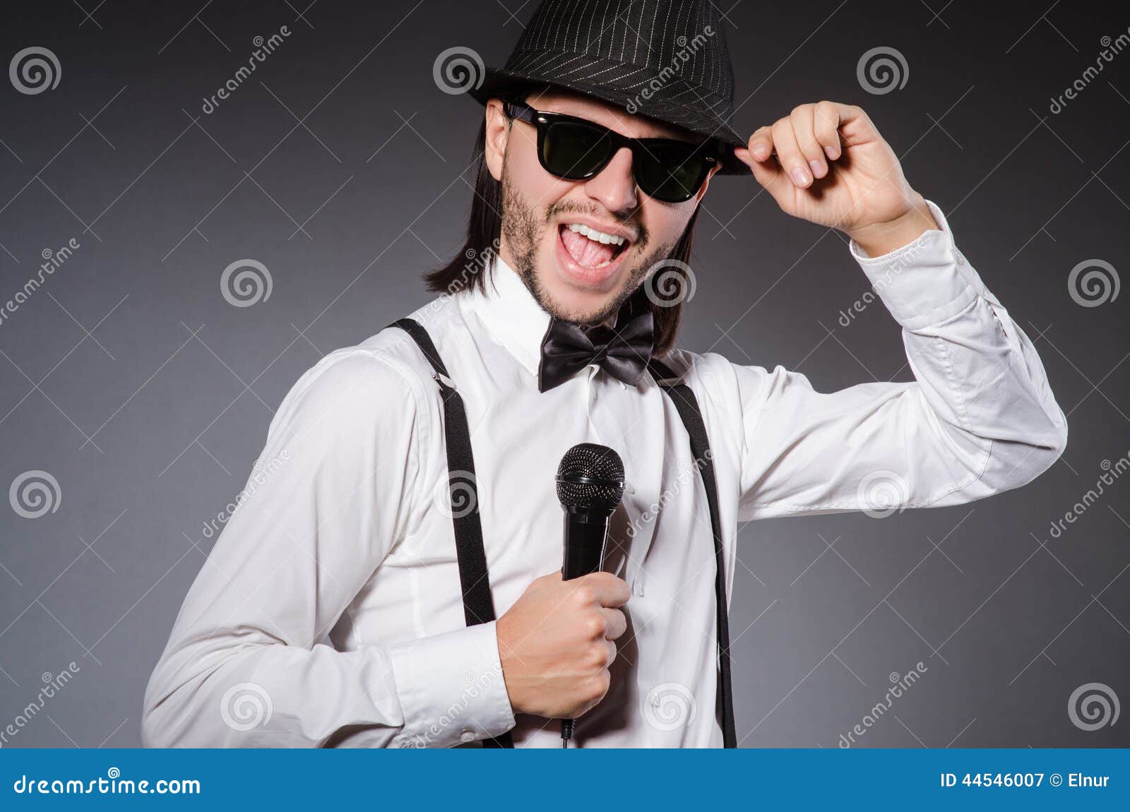 Funny Singer with Microphone Stock Image - Image of happy, audio: 44546007