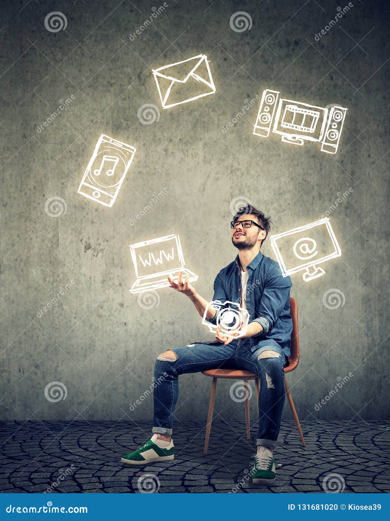 Funny Skillful Man Sitting on Chair and Juggling with Electronic ... Funny Skillful Man Sitting on Chair and Juggling with Electronic ...