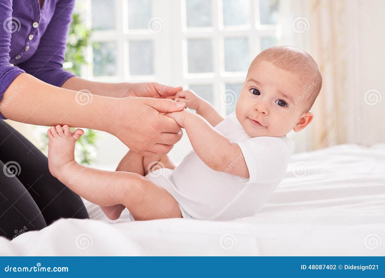 Funny Smiling Baby Gymnastic Practice with Mother Stock Photo - Image ...