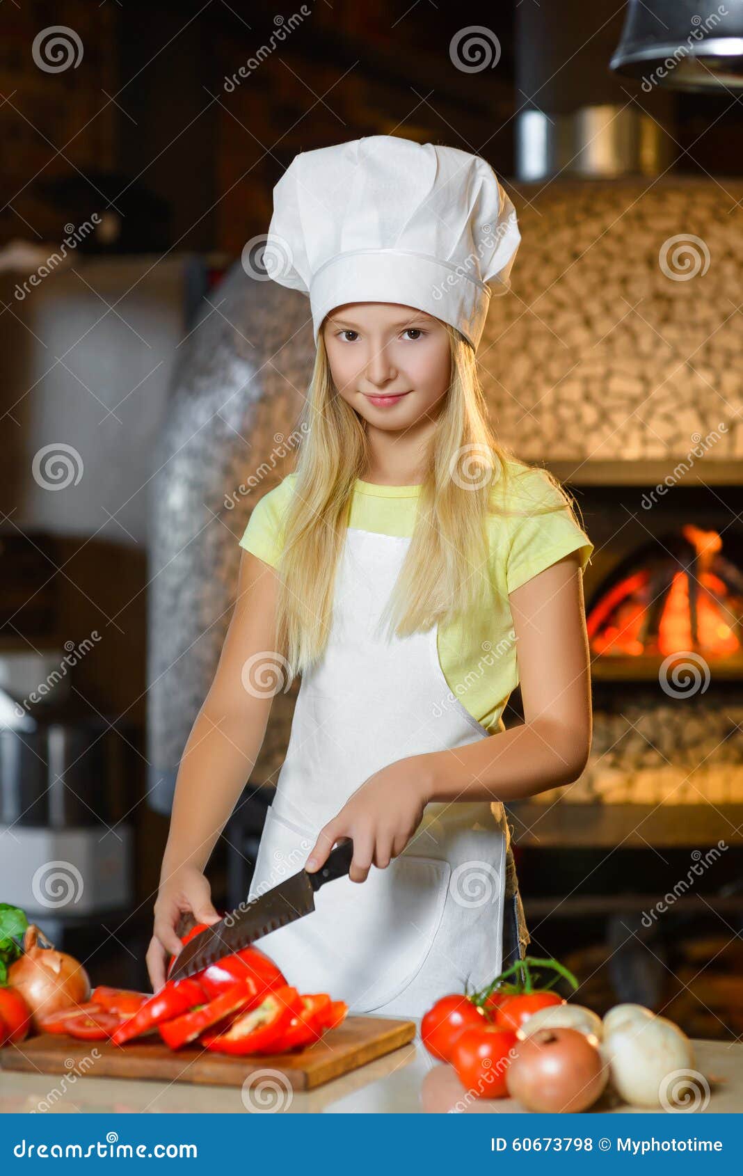 Funny Smiling Chef Girl Cuts Pepper at Restaurant Stock Photo - Image ...