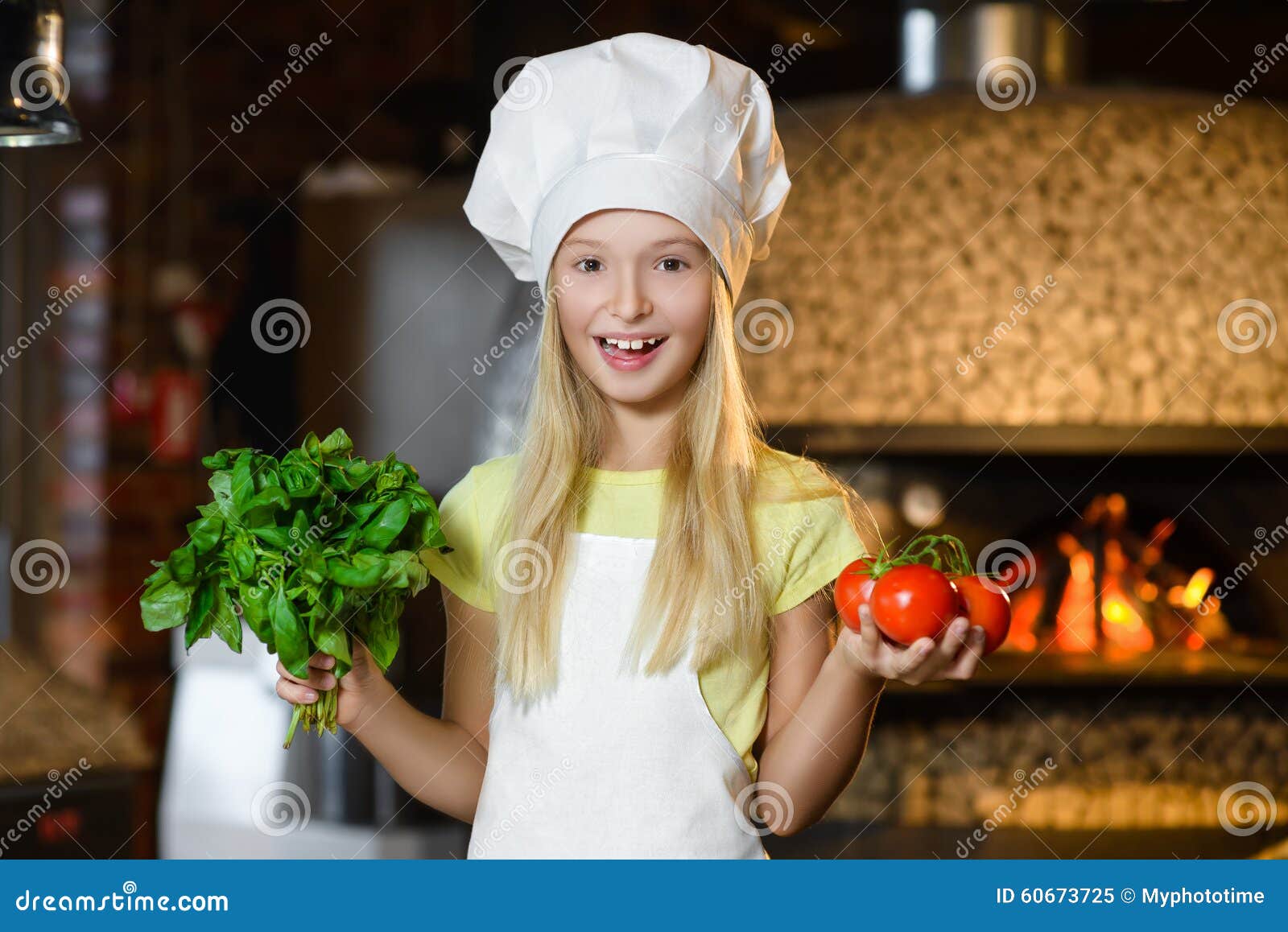 Funny Smiling Chef Girl Holding Tomatoes and Basil Stock Image - Image ...