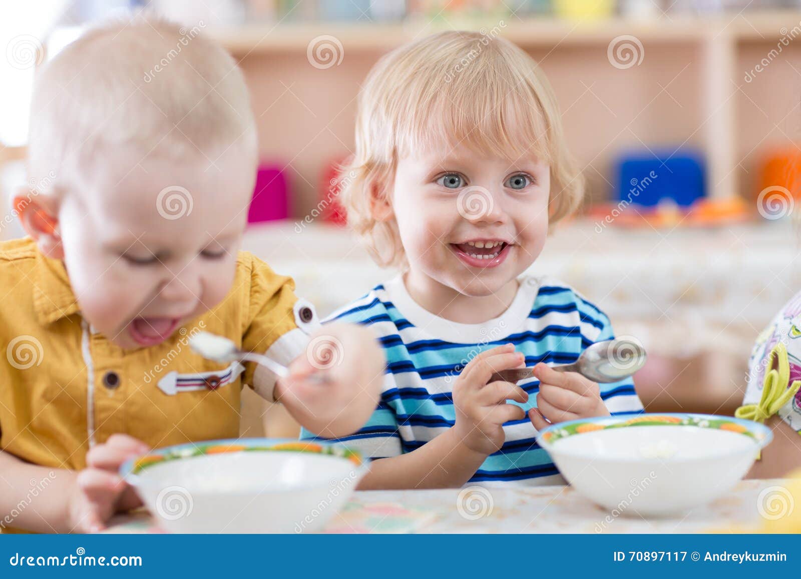 Funny Smiling Little Kid Eating in Kindergarten Stock Image - Image of ...
