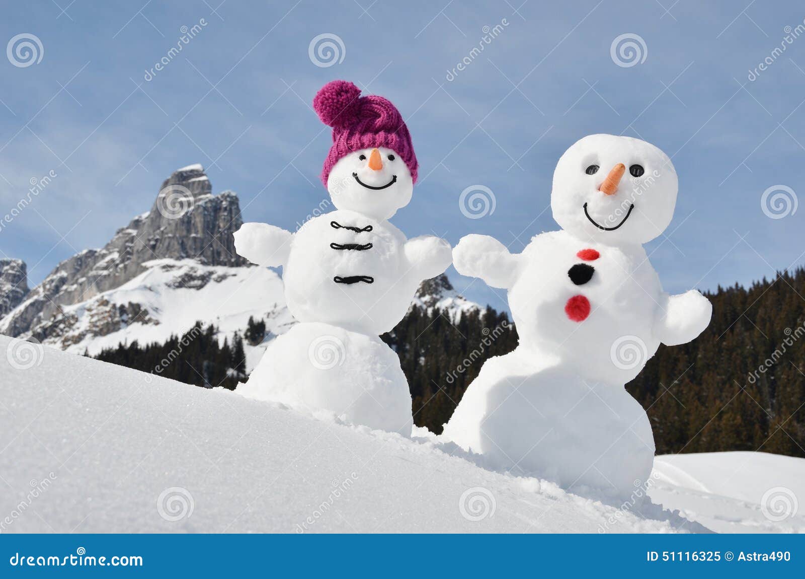 Funny snowmen stock image. Image of mountain, blue, playful - 51116325