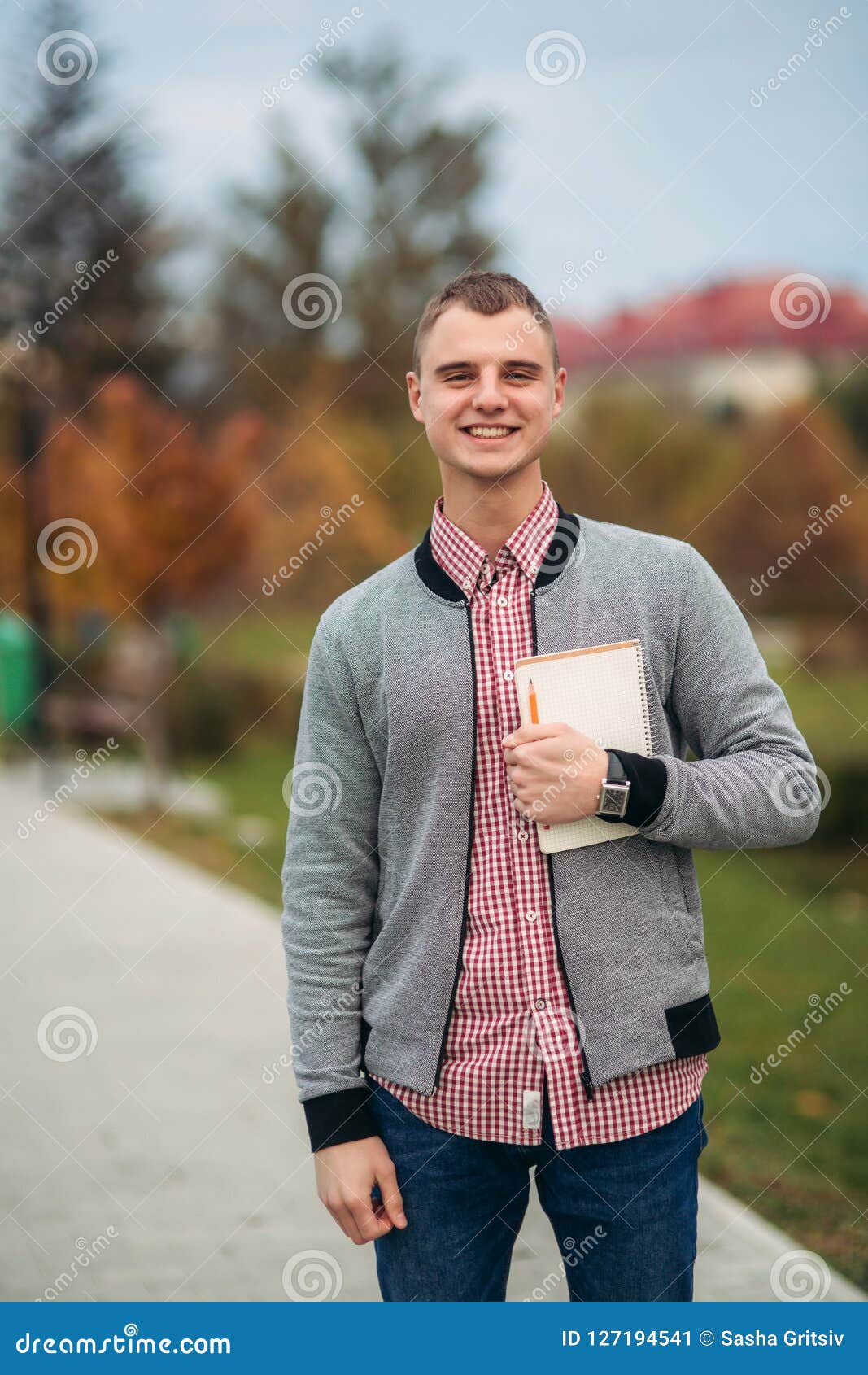 Funny Student with Notebook. Guy Stand in Park and Smile Stock Image ...