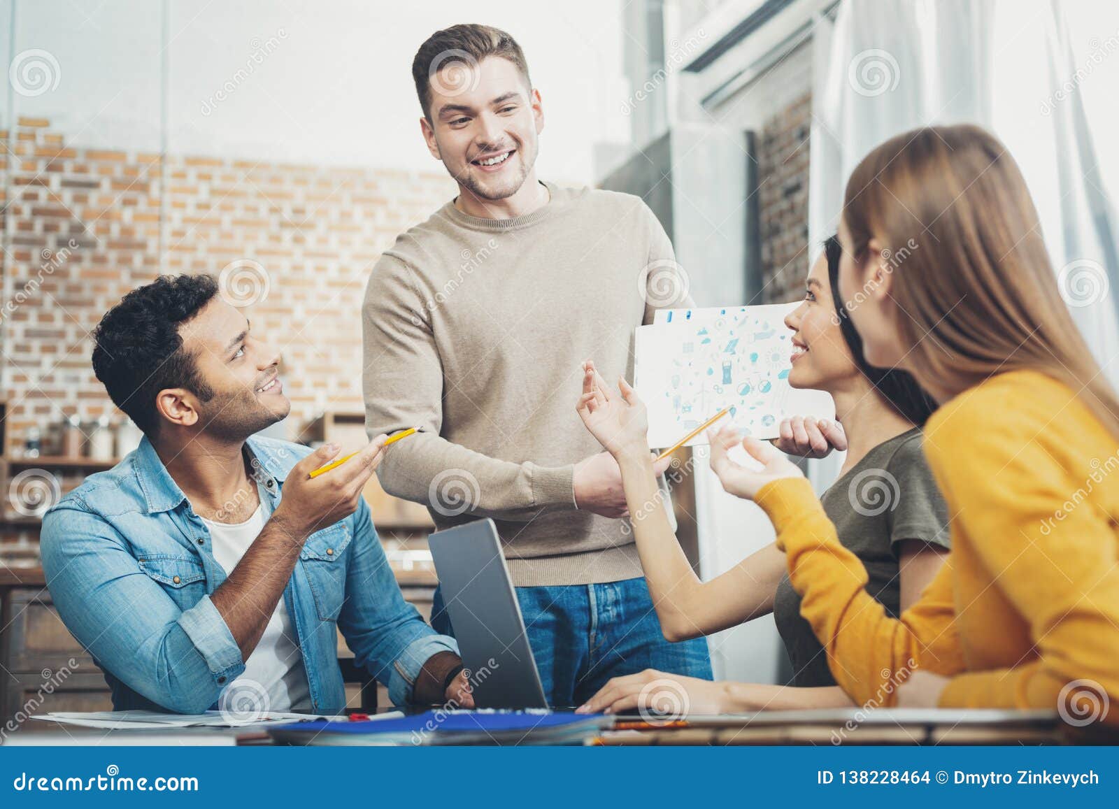 Jolly Four Students Exchanging Ideas Stock Photo - Image of community ...