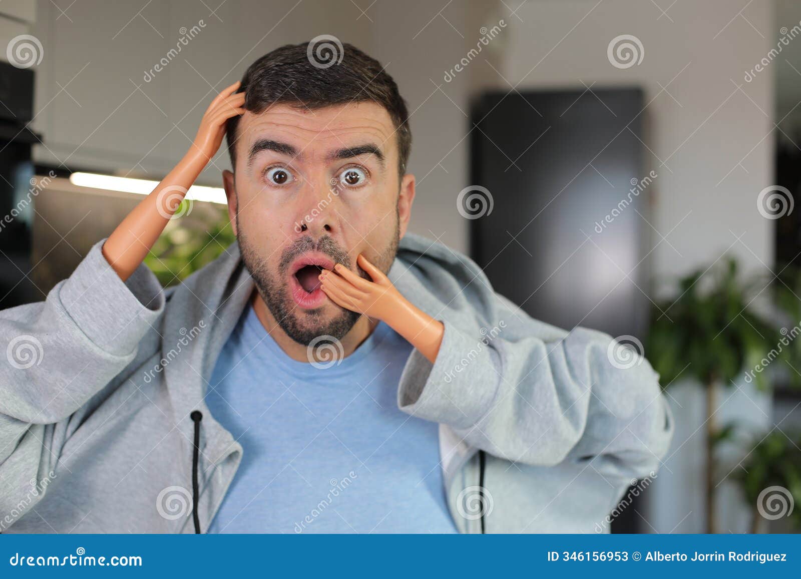 Funny Surprised Looking Man Using Small Toy Plastic Arms Stock Image ...