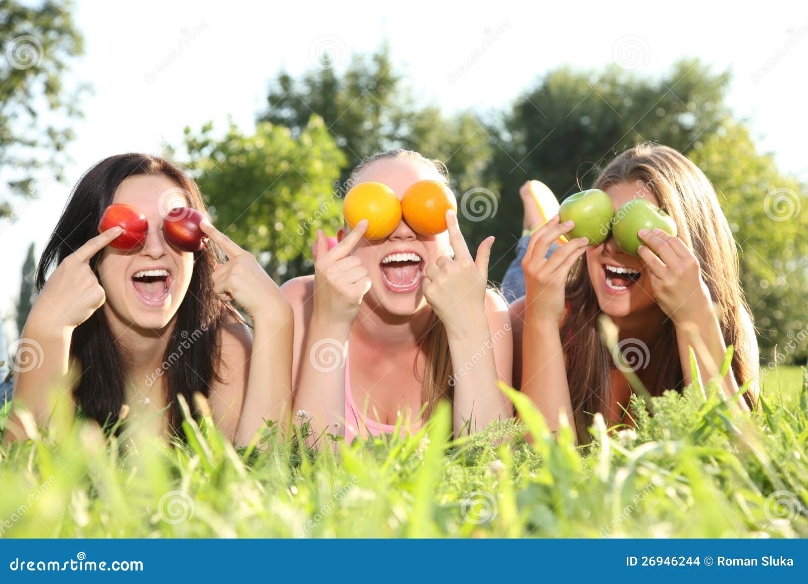 Funny Teenagers Posing in the Grass Stock Photo - Image of beauty ...