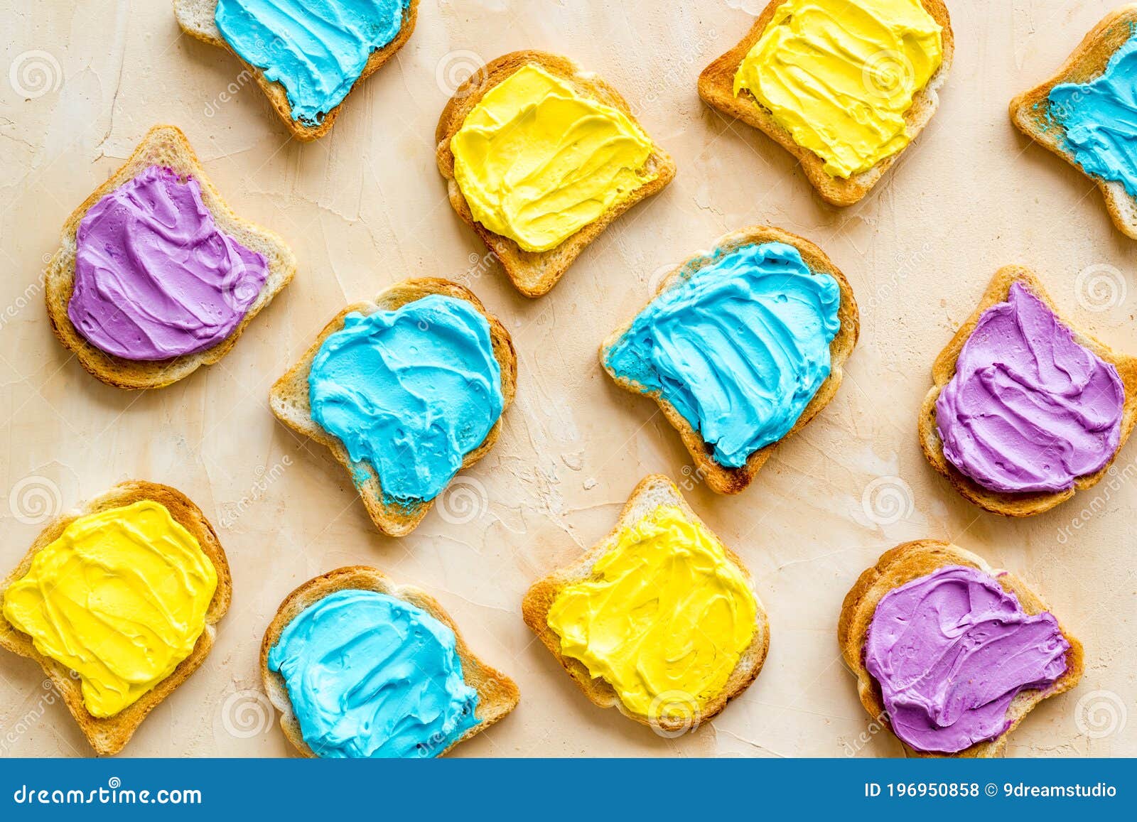 Funny Toasted Bread with Colored Cheese Spread. Overhead View Stock ...