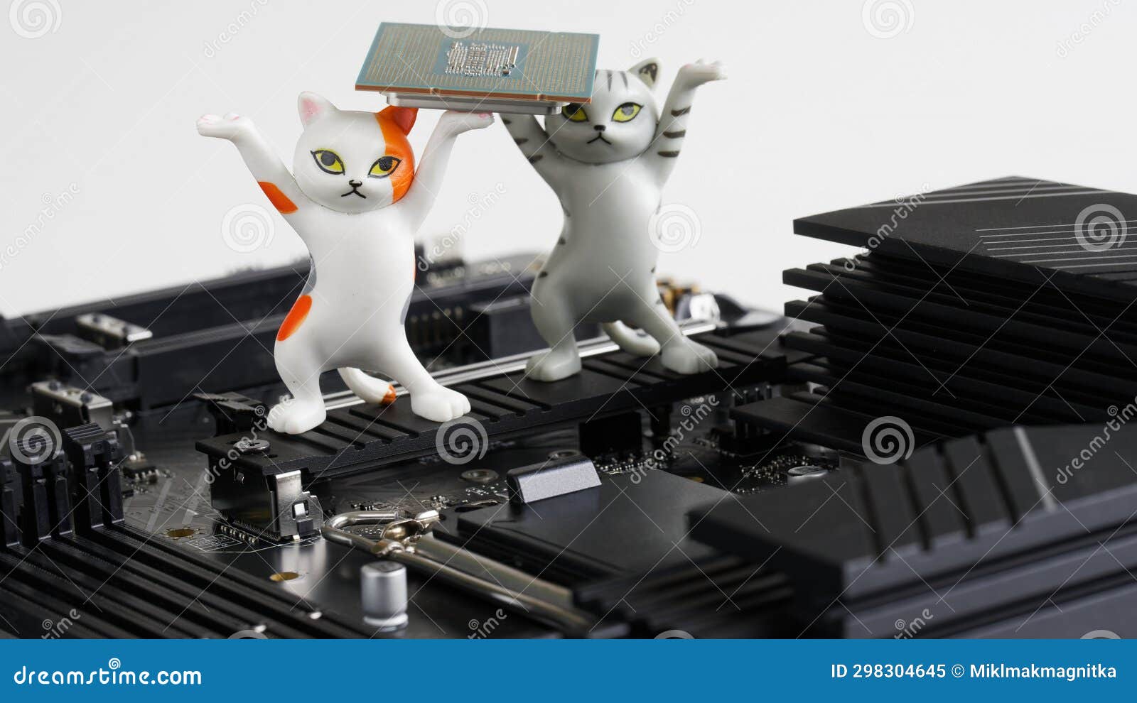 Funny Toy Kittens are Mounting a Computer Processor into Socket on the ...