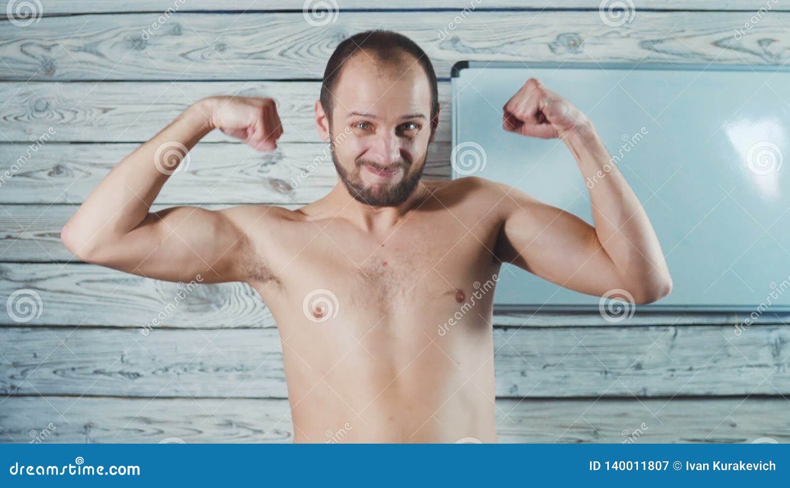 Funny Weak Sportsman Exercising. a THIN MAN SHOWS MUSCLE Stock Video ...