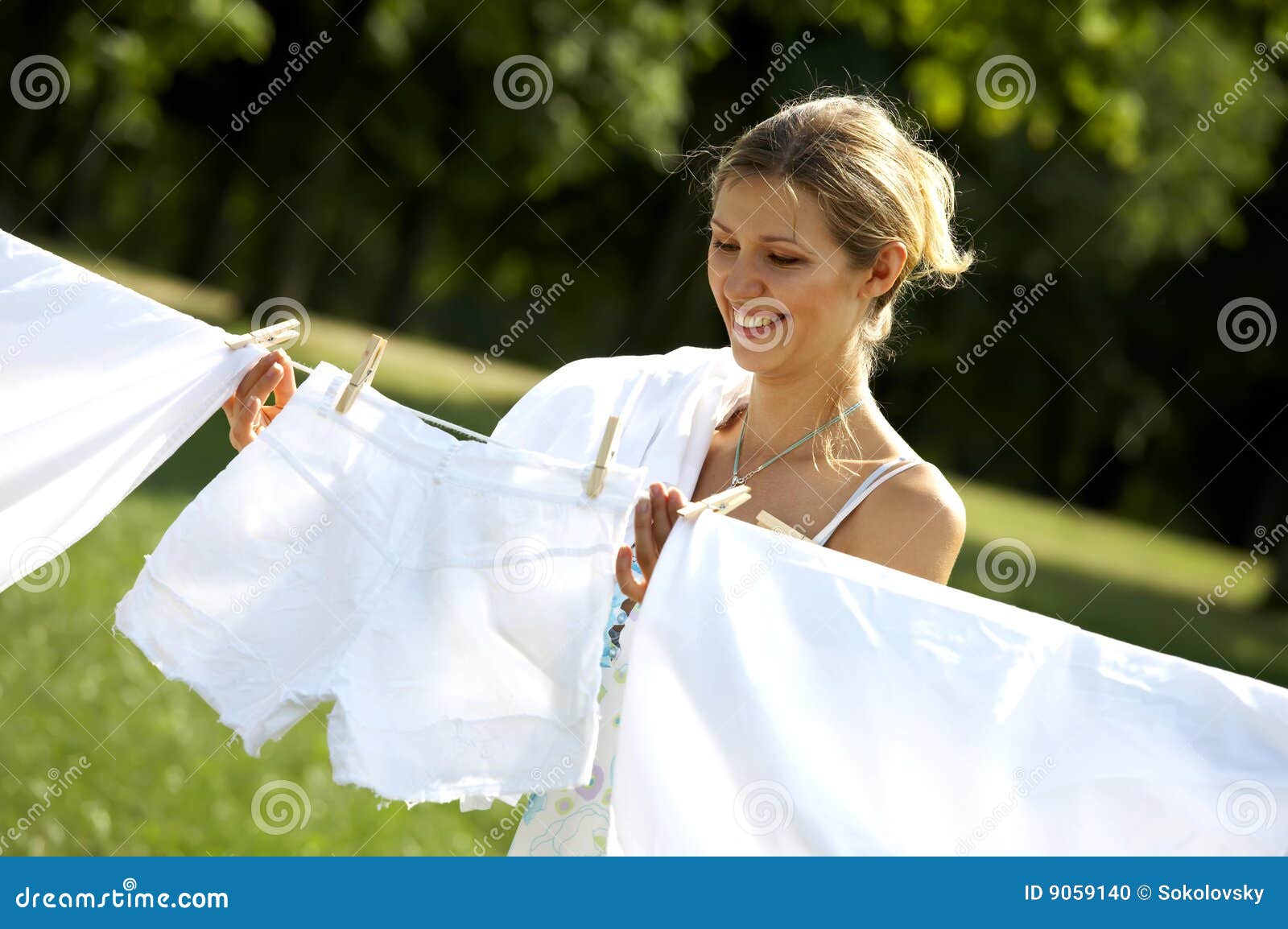 Funny Woman Hanging Clothes Stock Photo - Image of leisure, line: 9059140