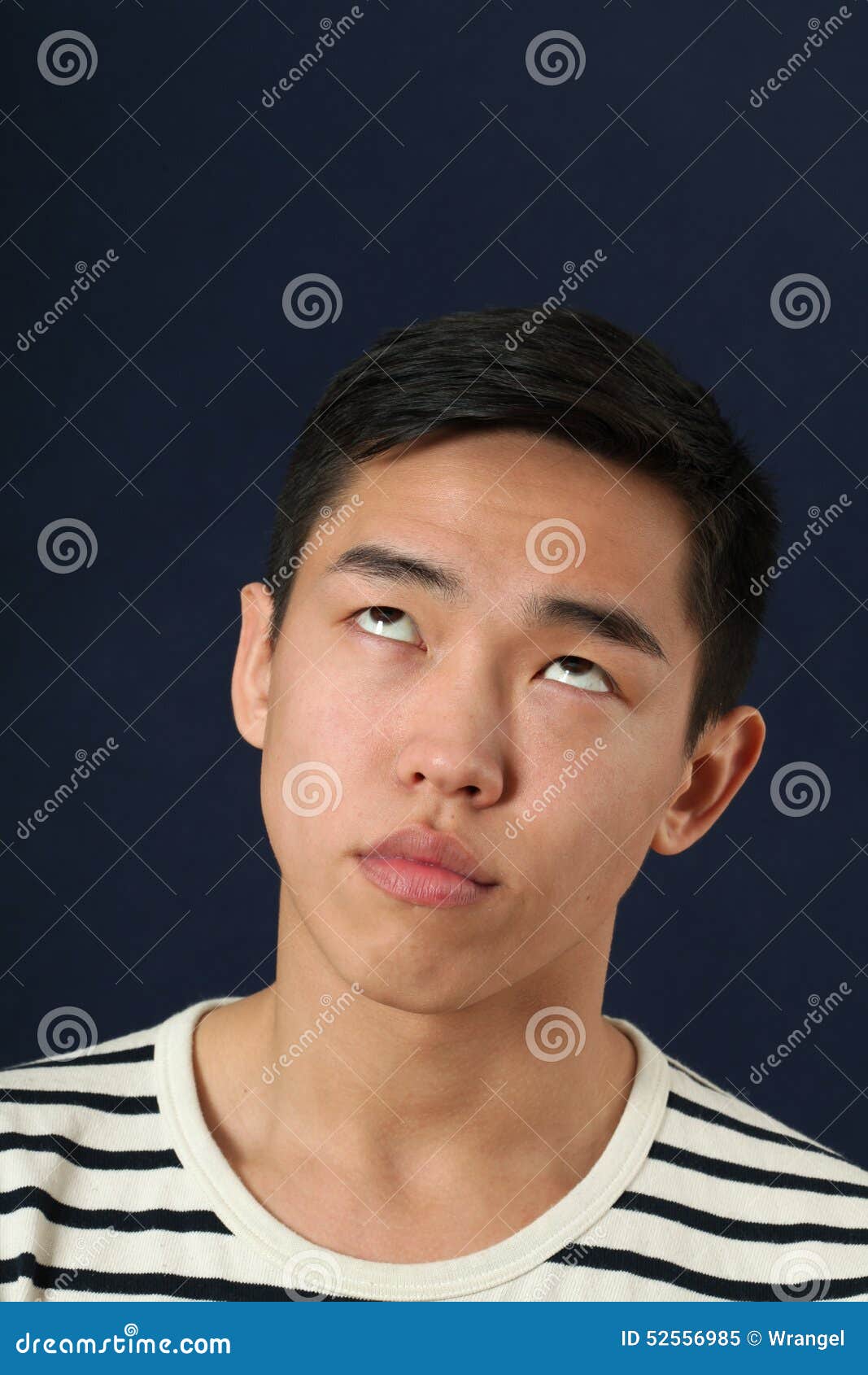 Funny Young Asian Man Making Face and Rolling Eyes Up Stock Image ...