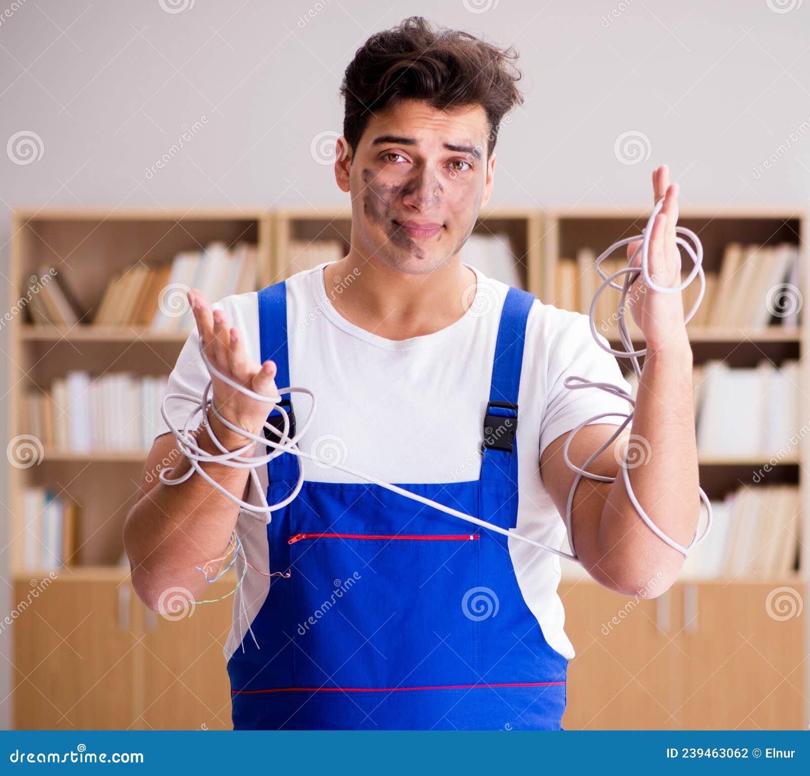 Funny Young Electrician Tangled in Cables Stock Photo - Image of dirty ...