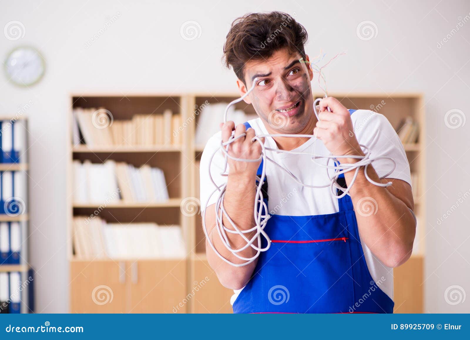 The Funny Young Electrician Tangled in Cables Stock Image - Image of ...