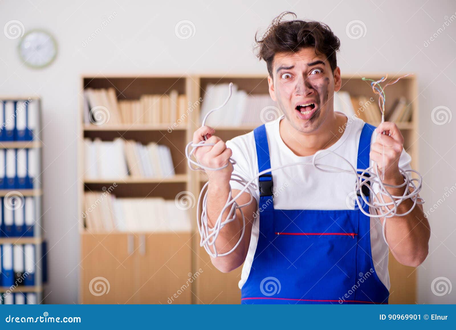 The Funny Young Electrician Tangled in Cables Stock Image - Image of ...