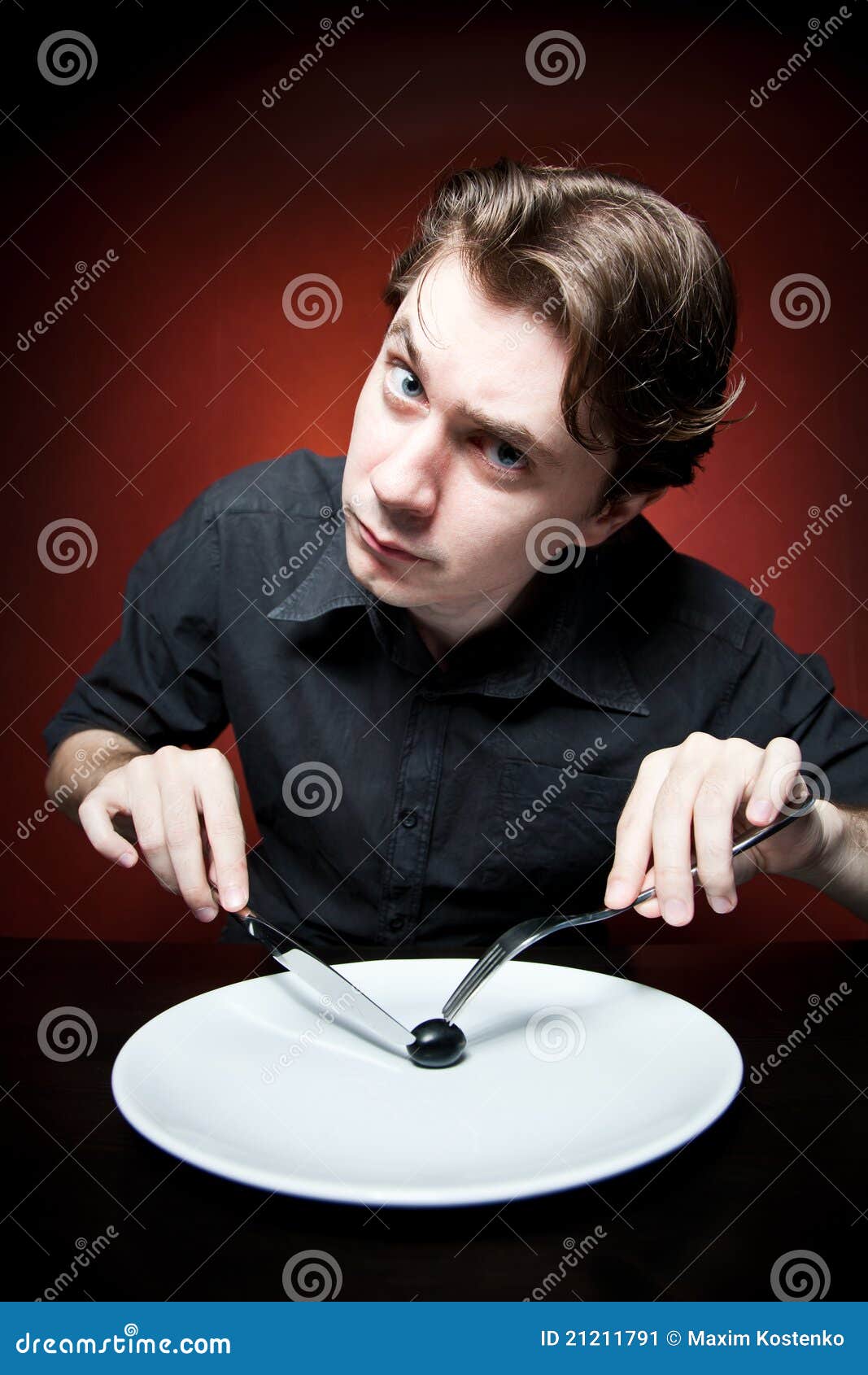 Funny young man eating stock image. Image of strange - 21211791