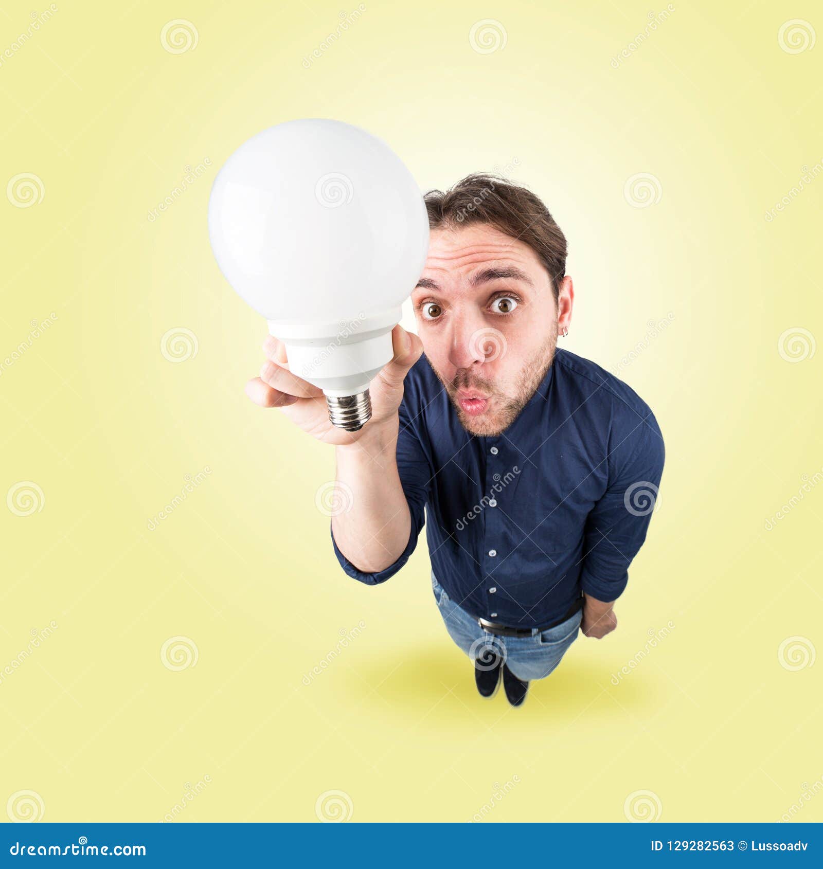 Funny Young Man with Light Bulb in His Hand Stock Image - Image of ...