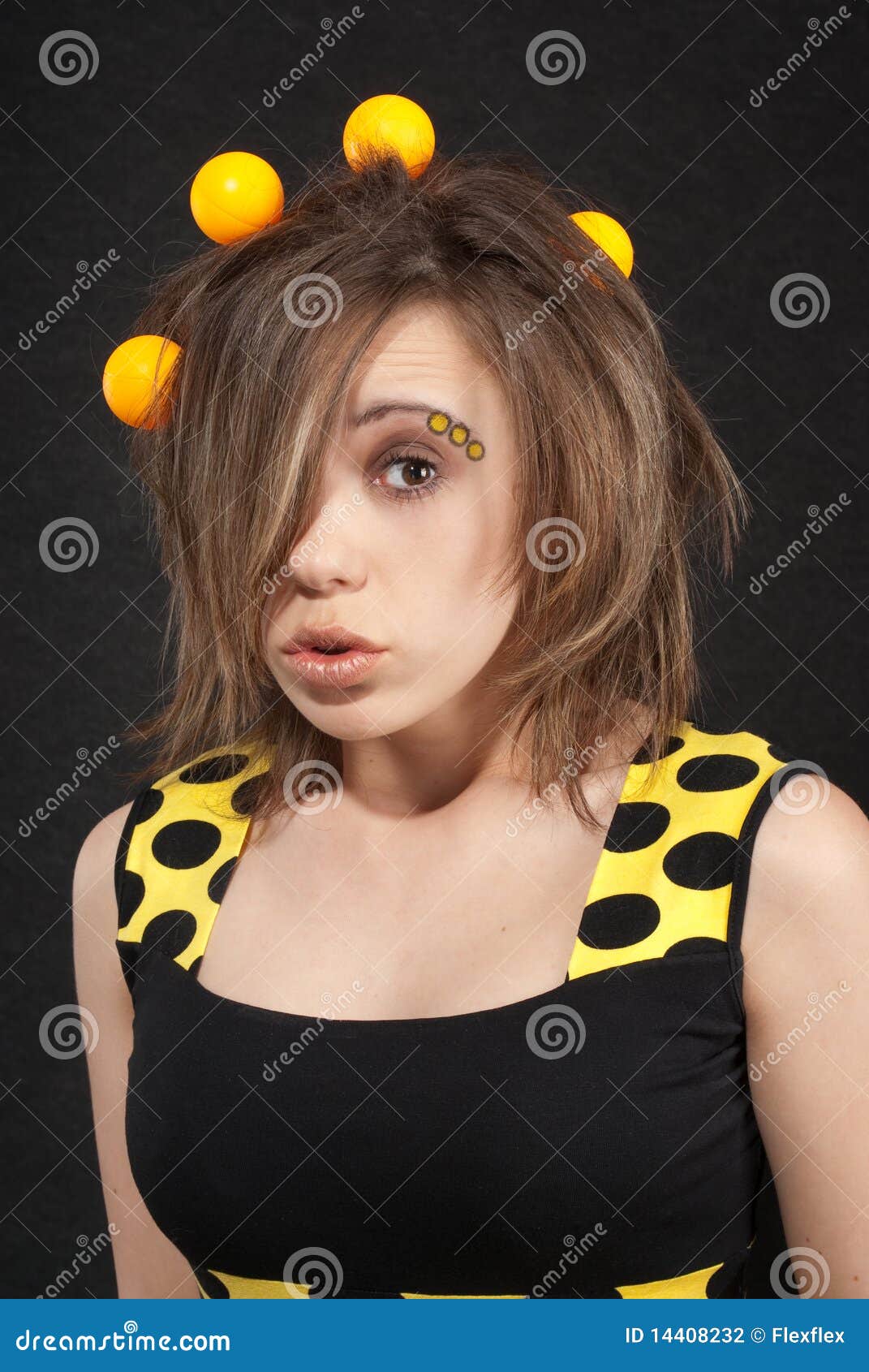 Funny Young Woman in Studio with Yellow Balls Stock Photo - Image of ...