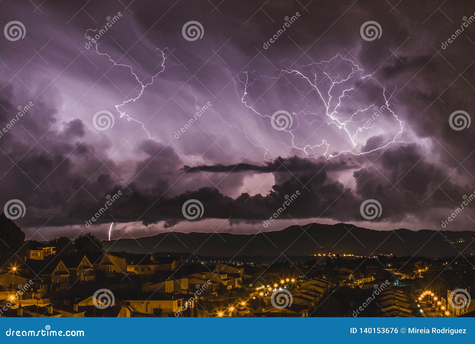 The Furious Lightning Falling Next To a Quiet Town. Stock Photo - Image ...