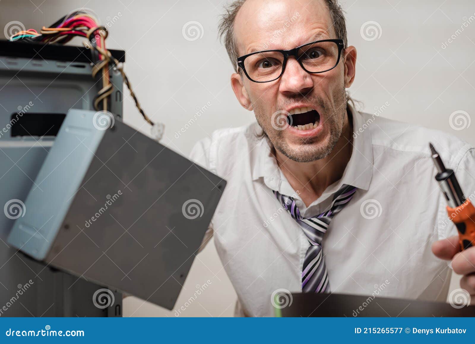 Furious Man with Screwdriver Stock Image - Image of corporate, angry ...