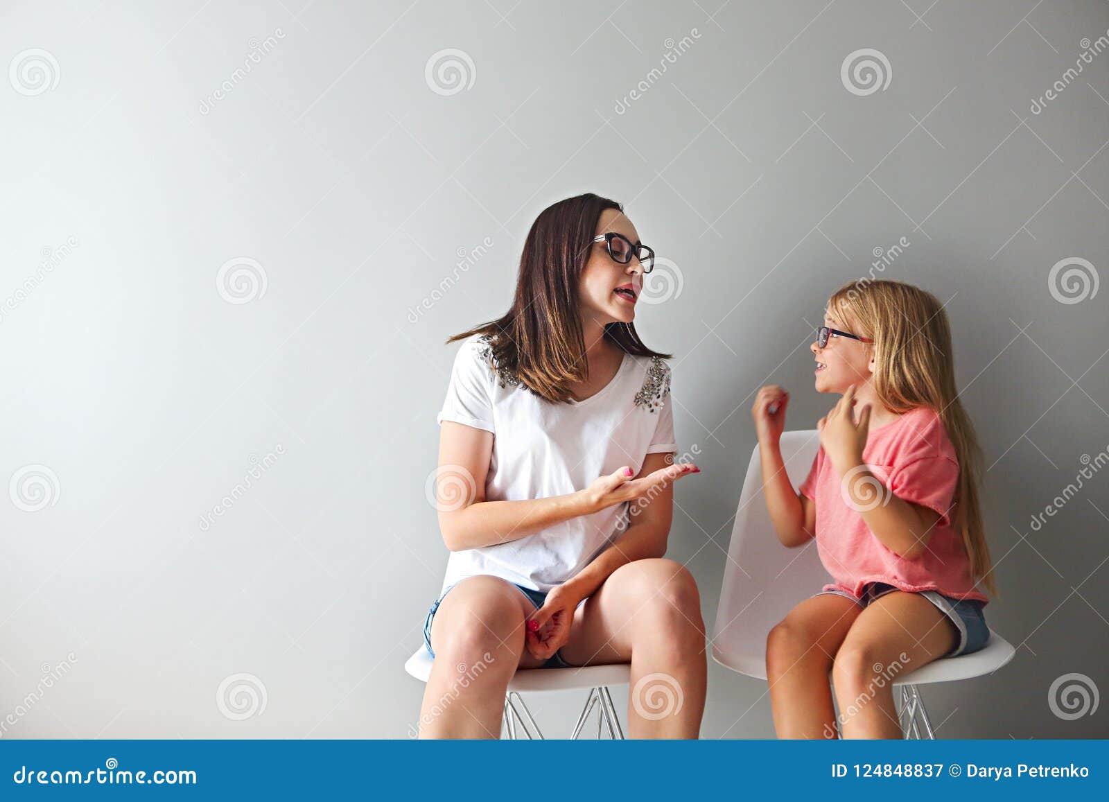 Furious Young Mother in a Discussion with Her Little Daughter Stock ...