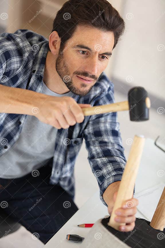 Furniture Assembler Master with Hammer Stock Image - Image of male ...