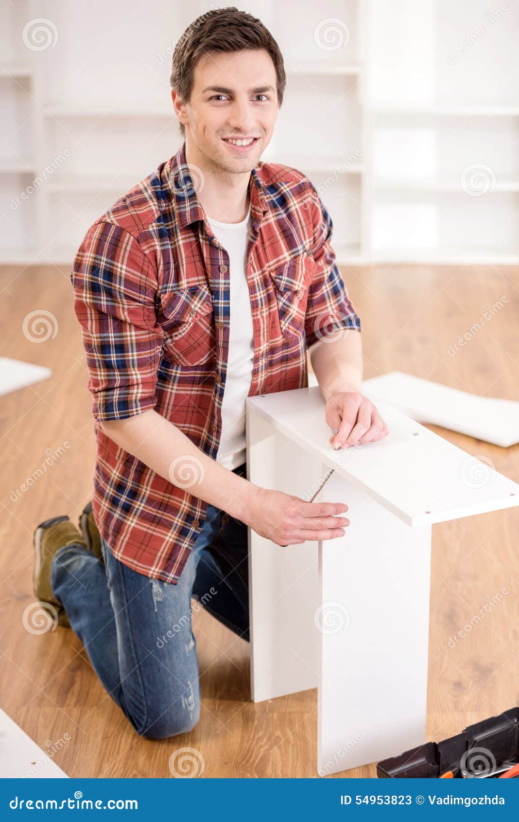 Furniture installation stock image. Image of male, assembler - 54953823