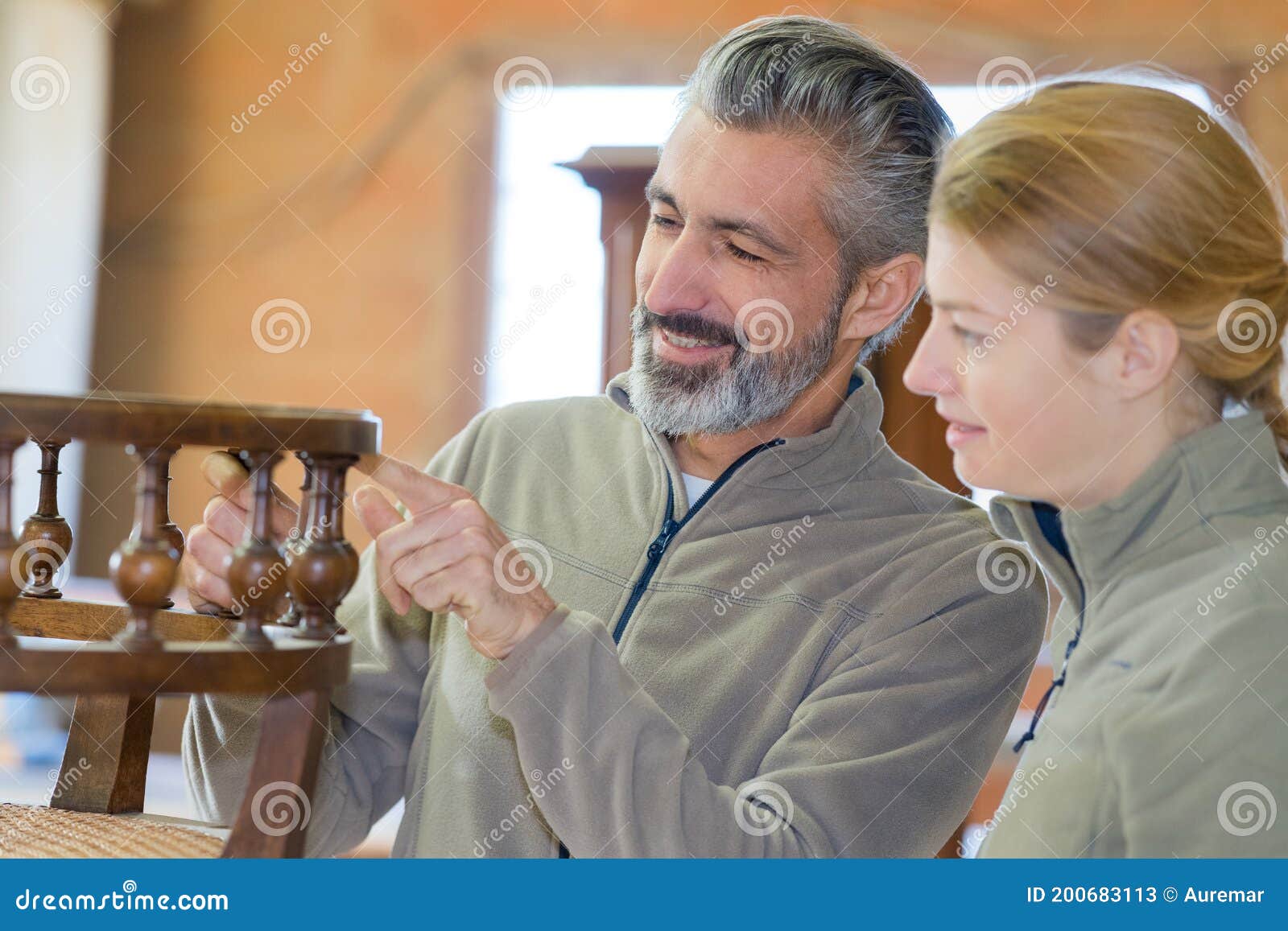 Furniture Maker in Workshop Pointing at Chair Design Stock Image ...