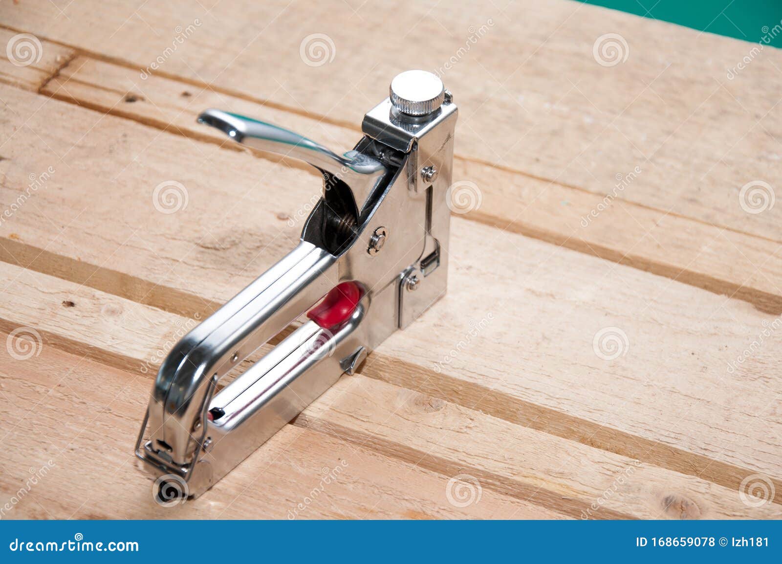 Furniture Stapler Closeup on Wooden Background. Furniture Maker Tool ...