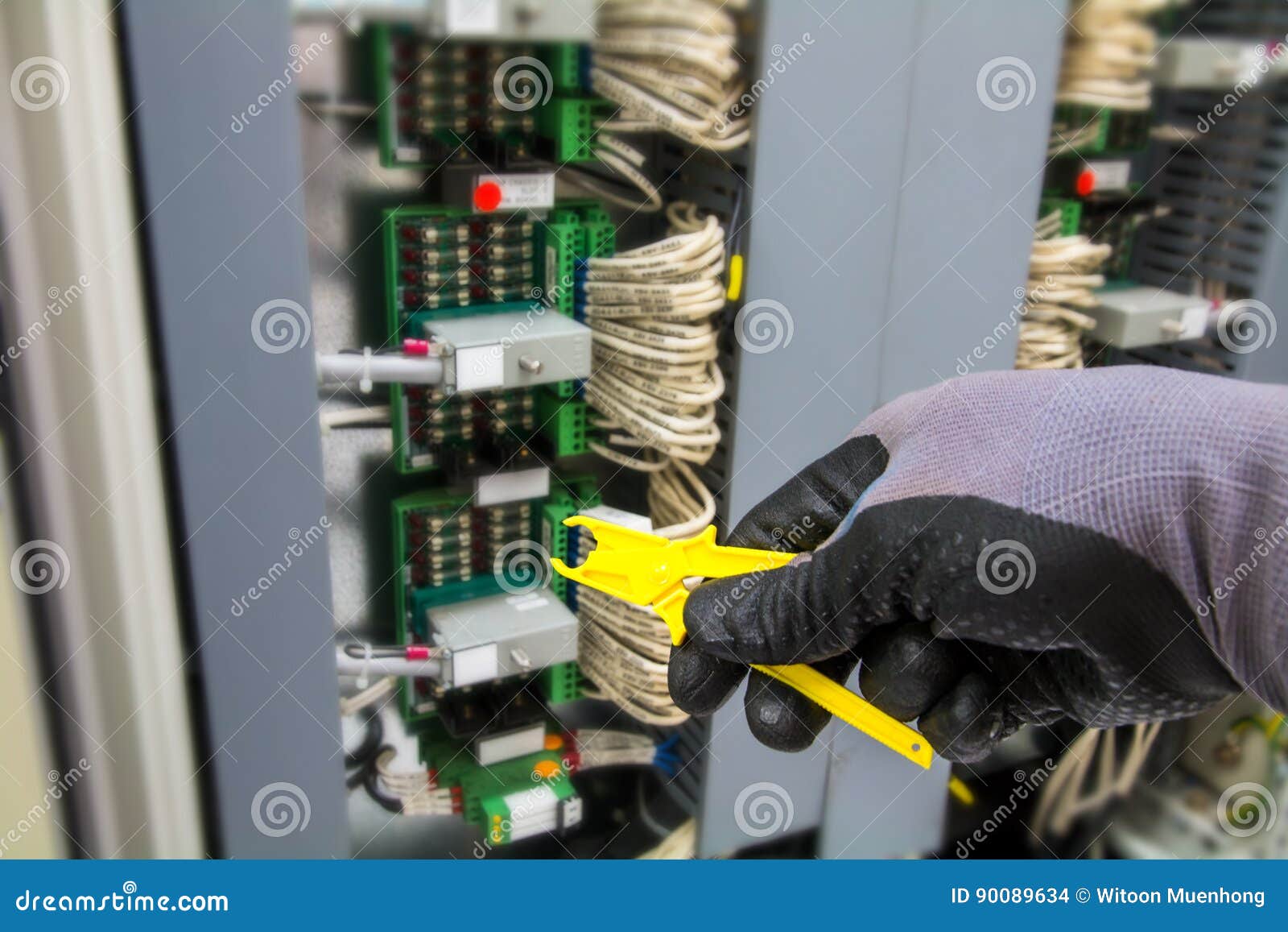 Fuse Removal Tool ,hand of Technician during Replace the Fuse in Stock ...