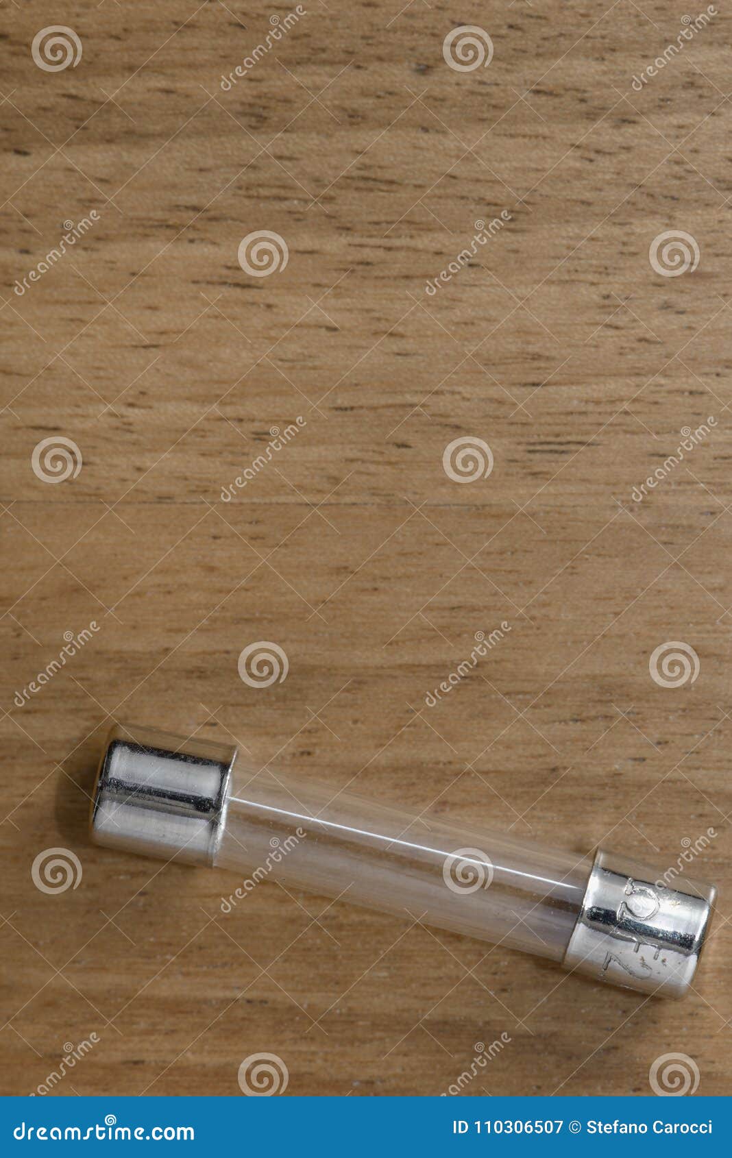 Fuse on a wood table stock image. Image of electricity - 110306507