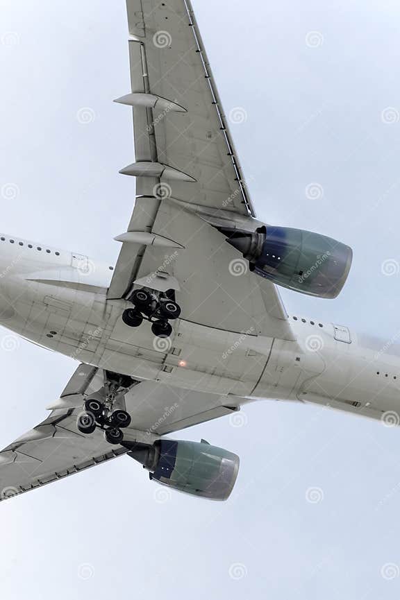 Fuselage and Two Jet Engines of a Low Stock Photo - Image of landing ...