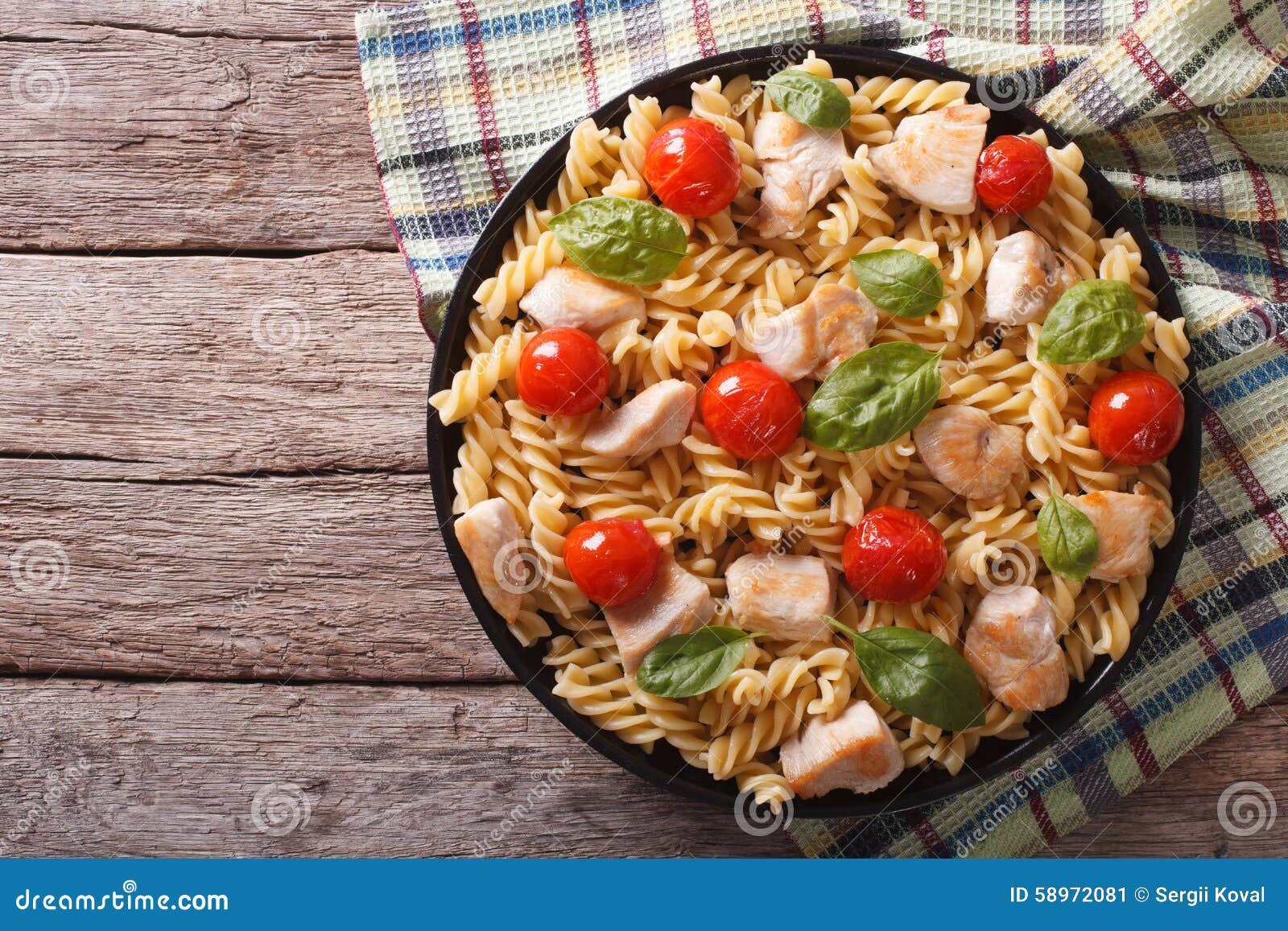 Fusilli Pasta with Chicken, Tomatoes and Basil on Plate. Horizon Stock ...