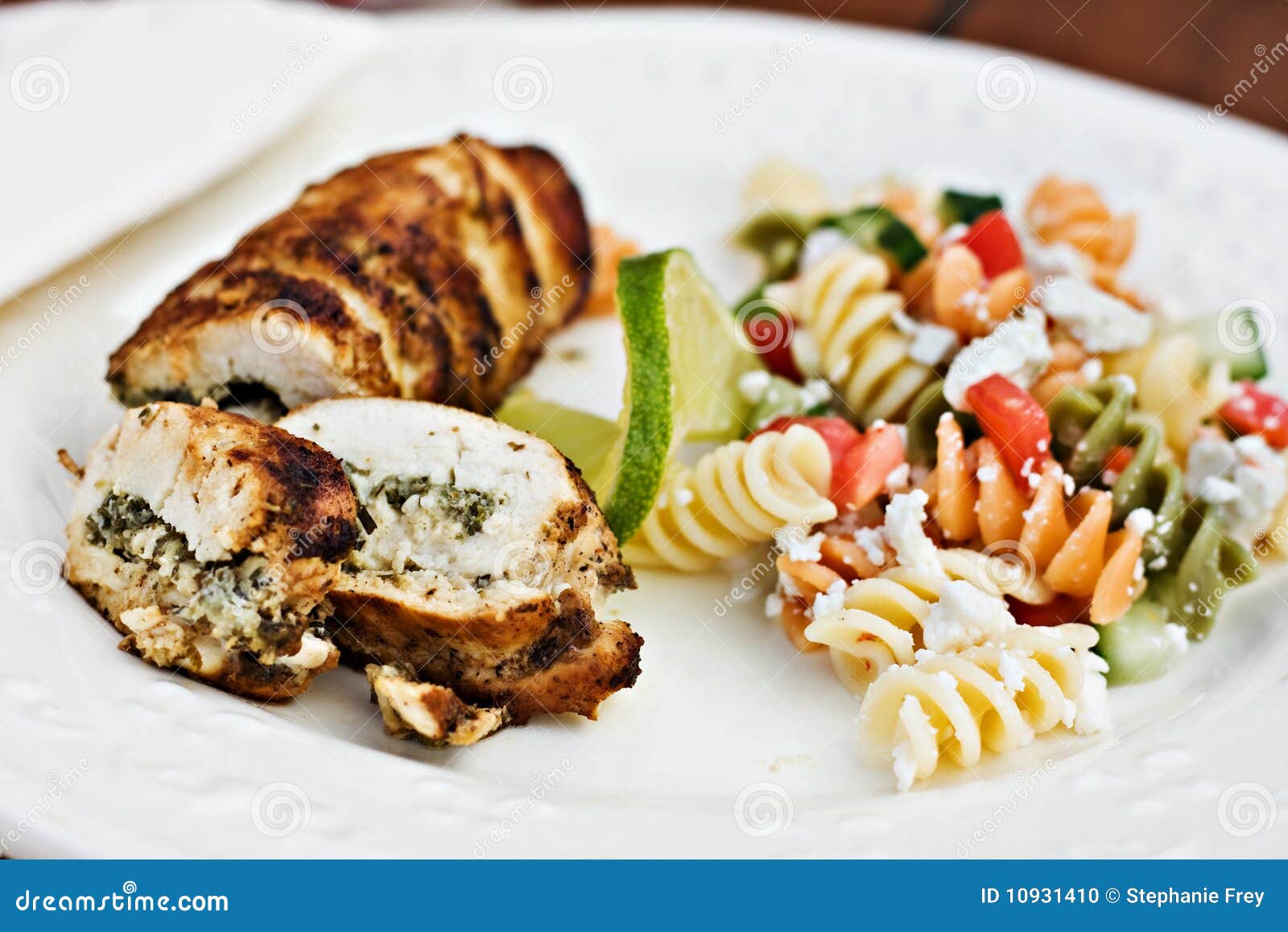 Fusilli Salad Served with Chicken Roulade Stock Photo - Image of ...