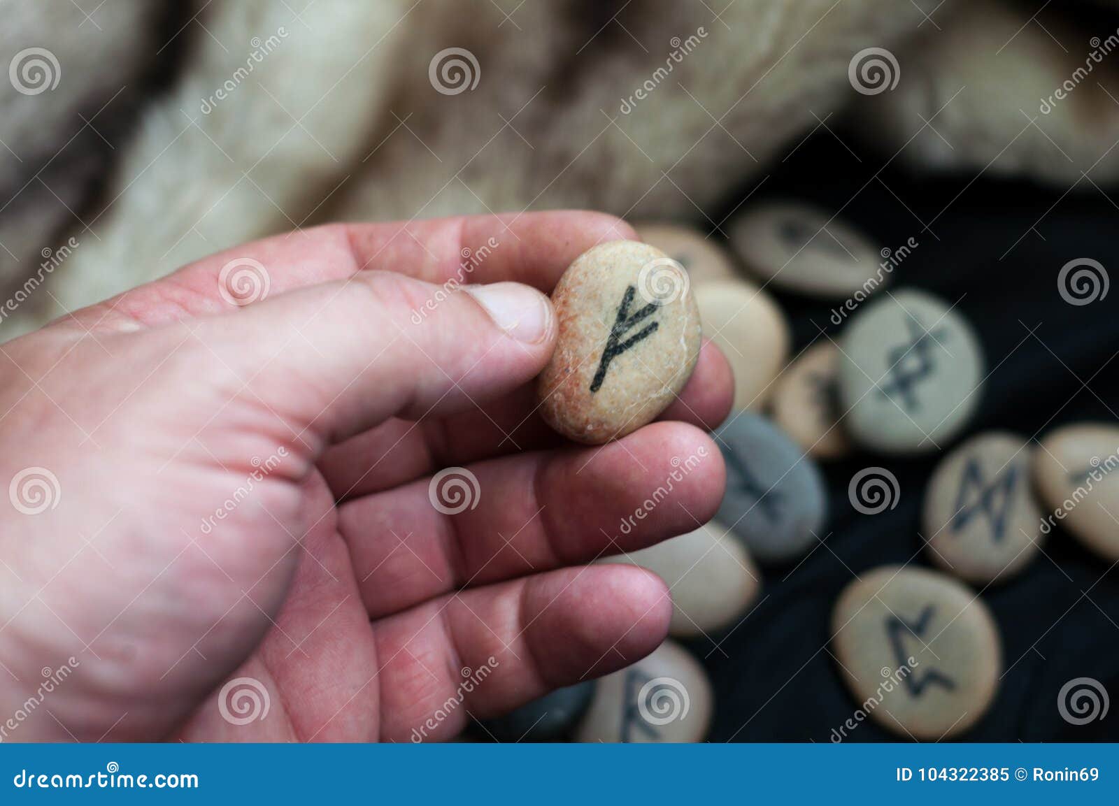 Stone runes on the hand stock image. Image of future - 104322385