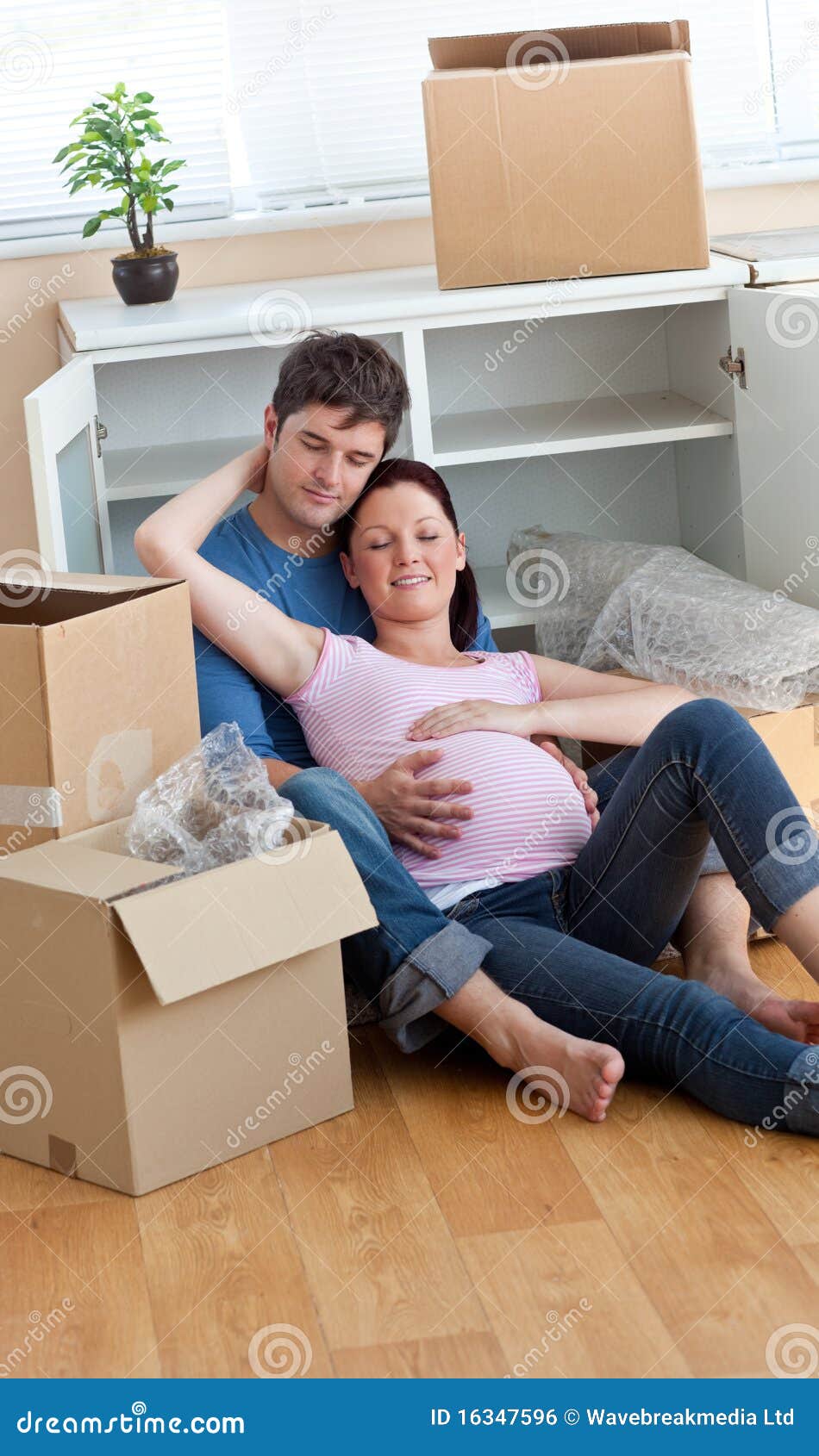 Future Parents Relaxing on the Floor Stock Photo - Image of adult, care ...