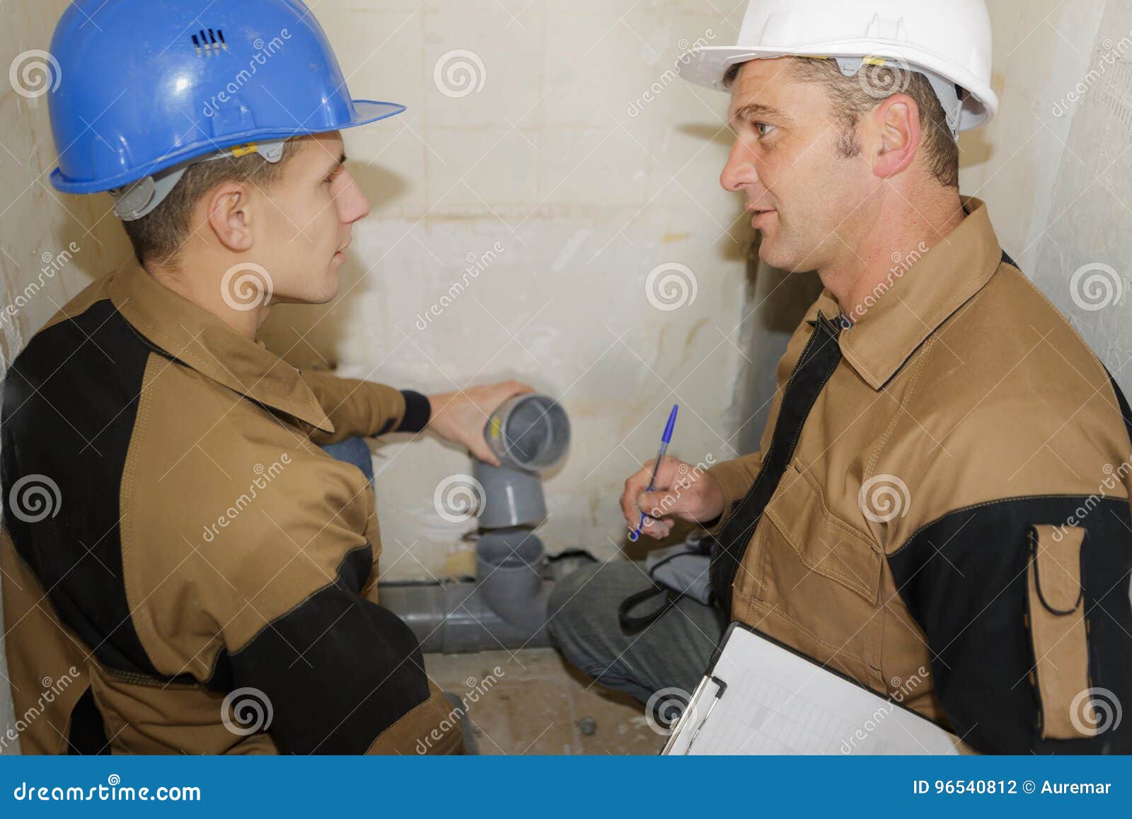 Future plumber and teacher stock photo. Image of apprenticeship - 96540812