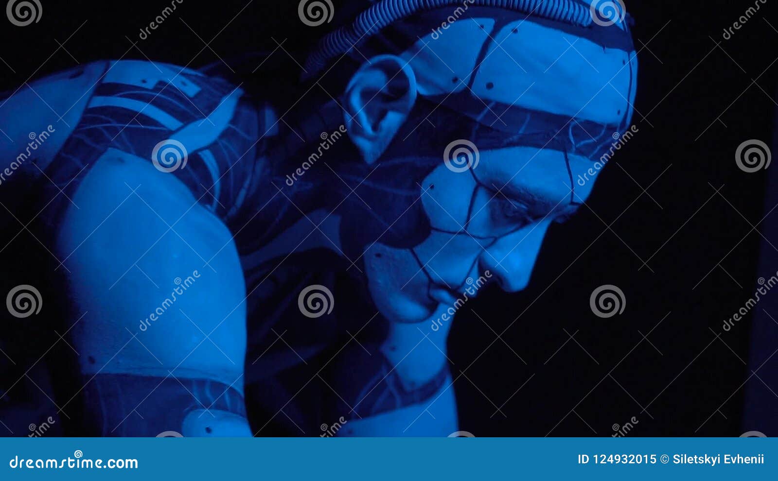 Creepy Android Mechanically Moves Looking for Someone in the Dark Stock ...