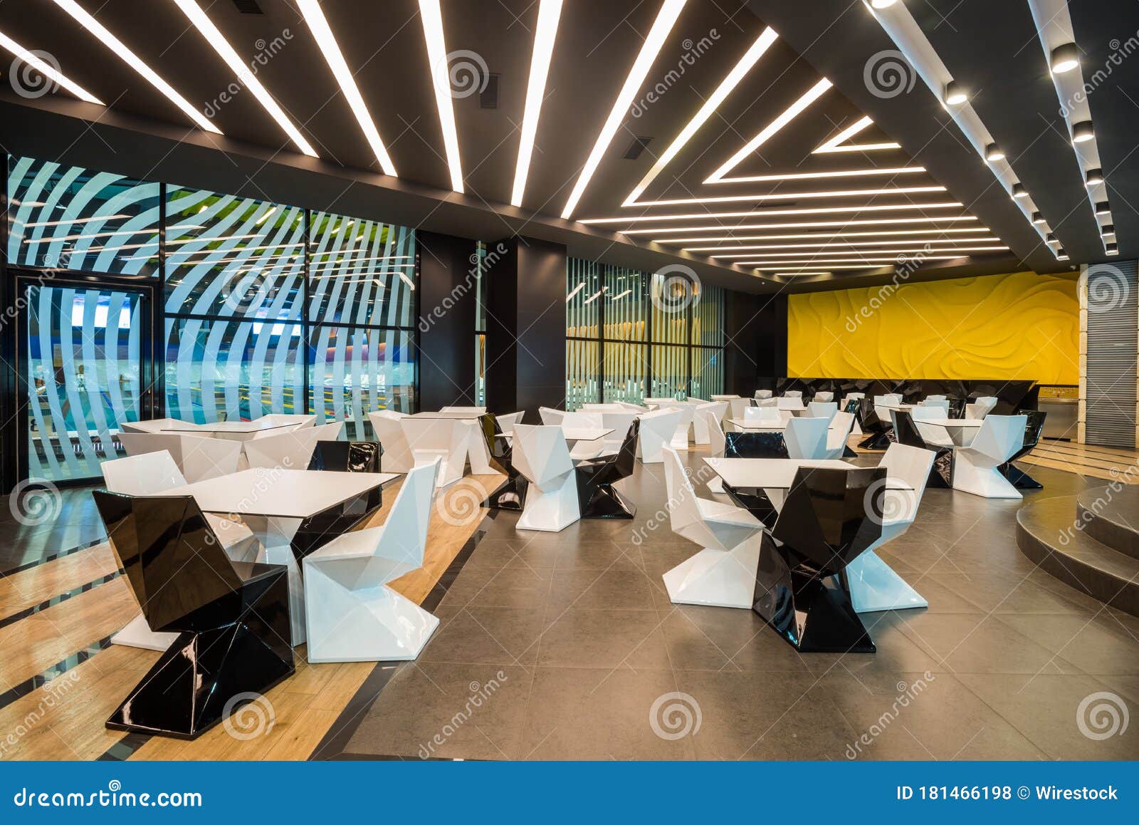 Futuristic Design of Chairs and Tables in a Dining Hall Stock Photo ...