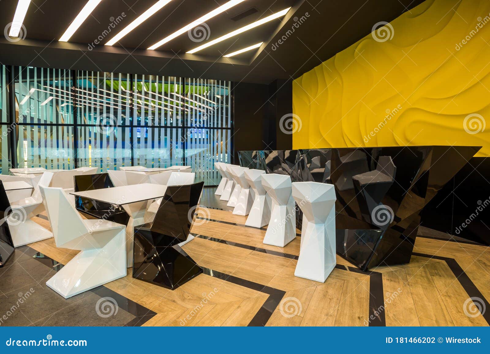 Futuristic Design of Chairs and Tables in a Dining Hall Stock Photo ...