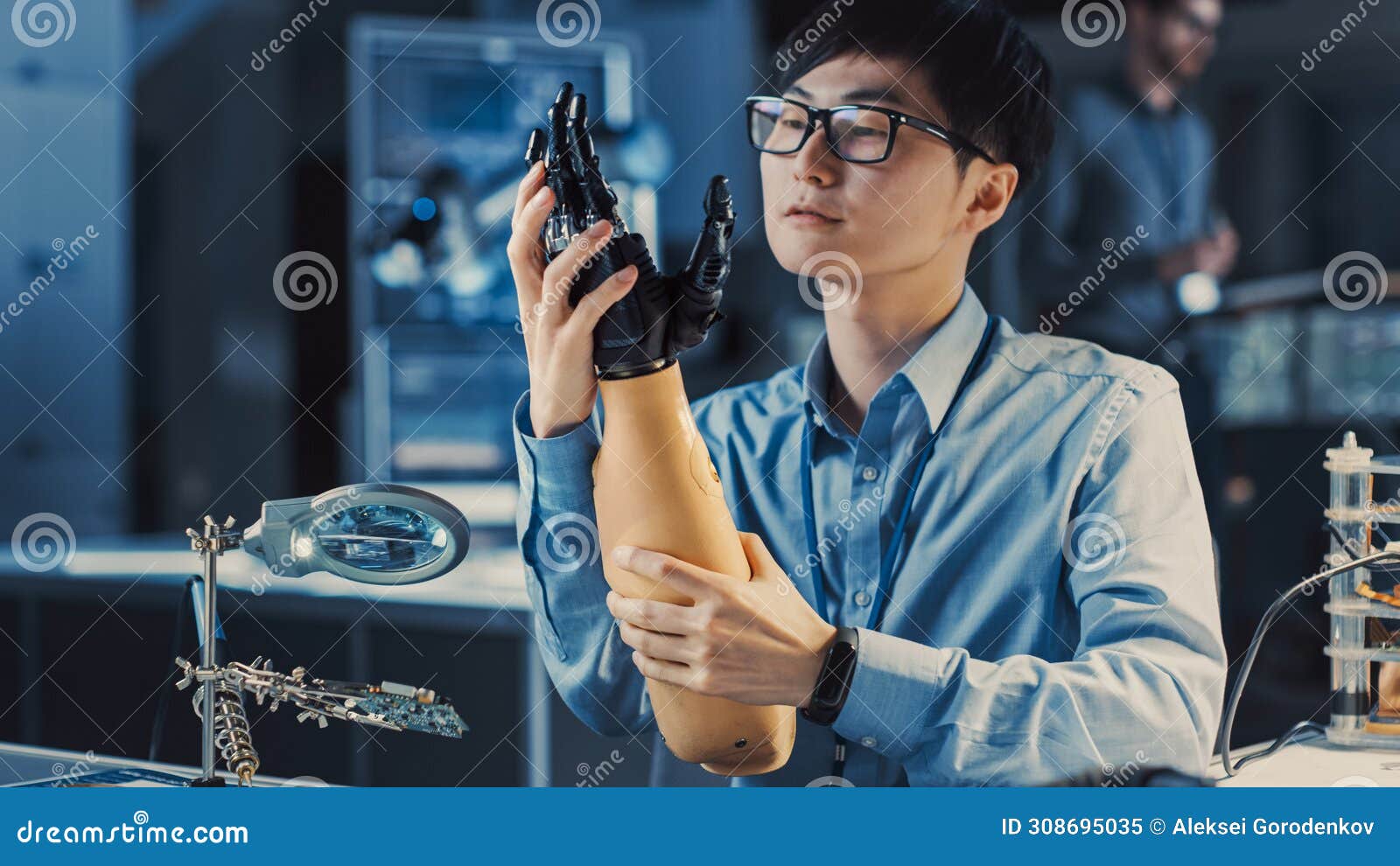 Futuristic Prosthetic Robot Arm Being Tested by a Professional Japanese ...