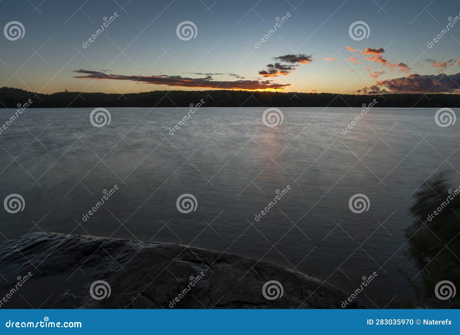 Fuzzy Lake Water with Sunset Stock Photo - Image of looking, fuzzy ...