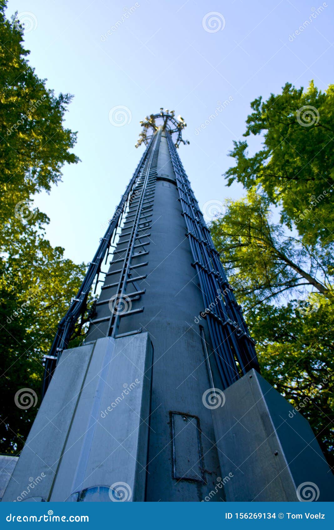 3G, 4G, LTE Telecommunication Mast and Green Trees at the Blue Sky ...
