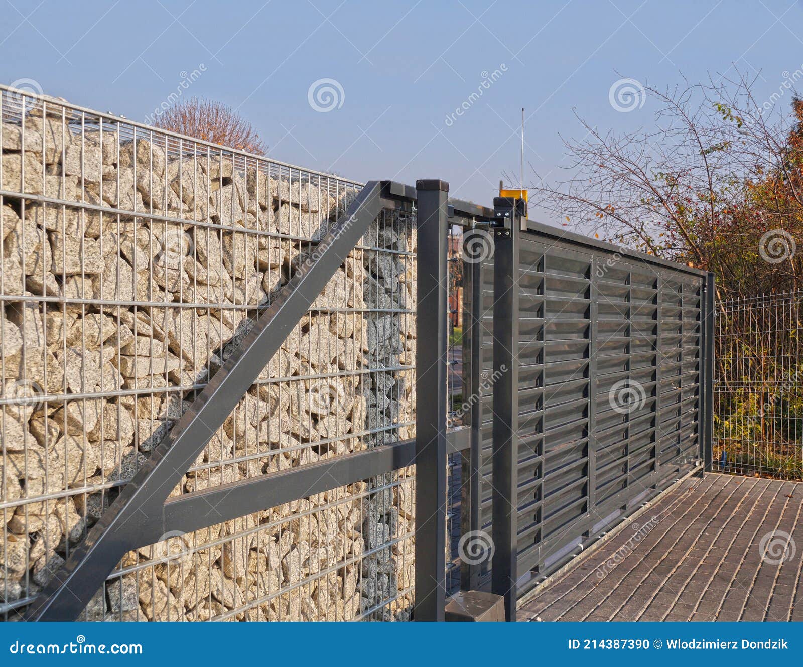 Gabion. Automatic Entrance Gate Used in Combination with a Wall Made of ...