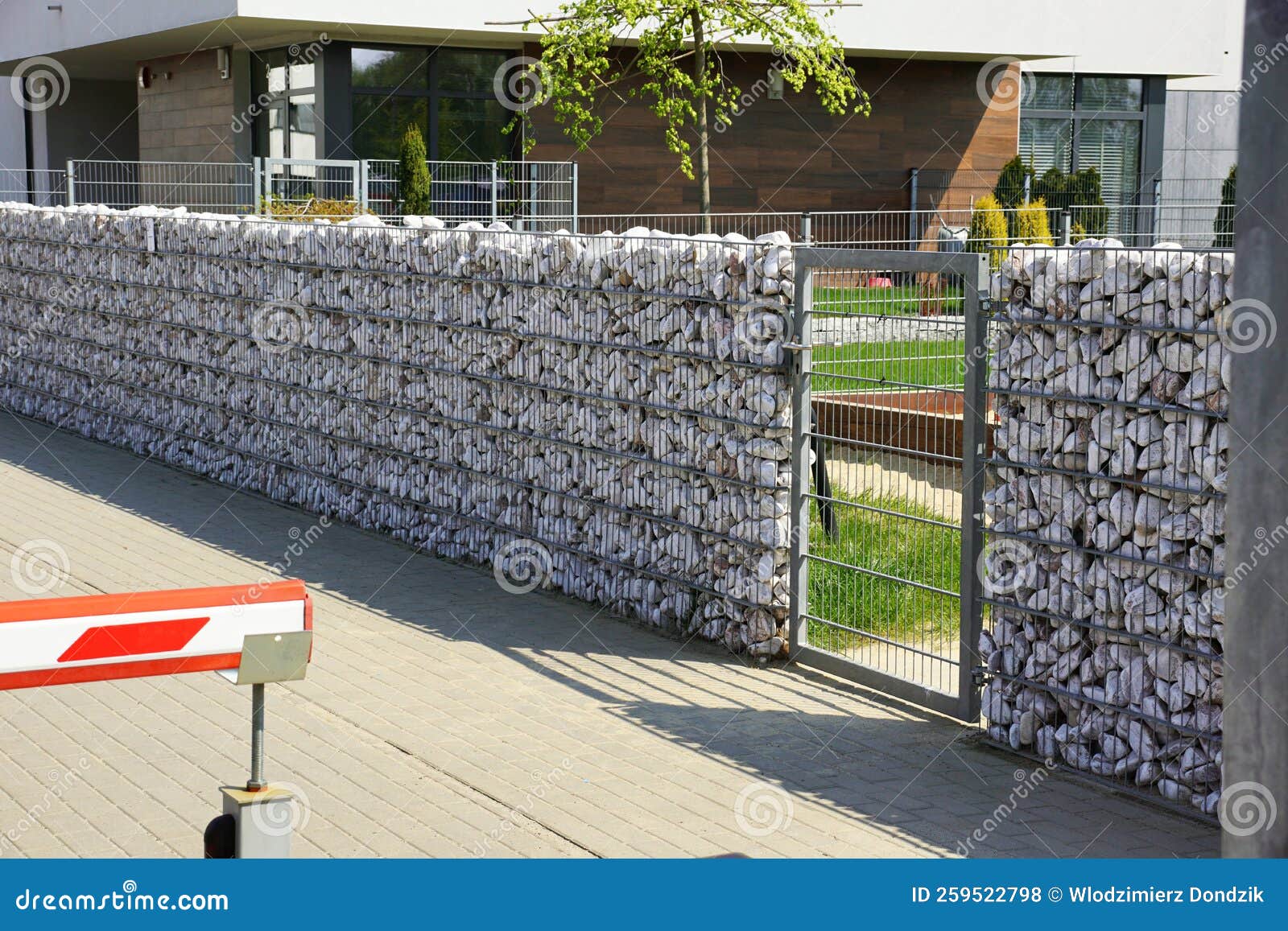 Gabion. Automatic Entrance Gate Used in Combination with a Wall Made of ...