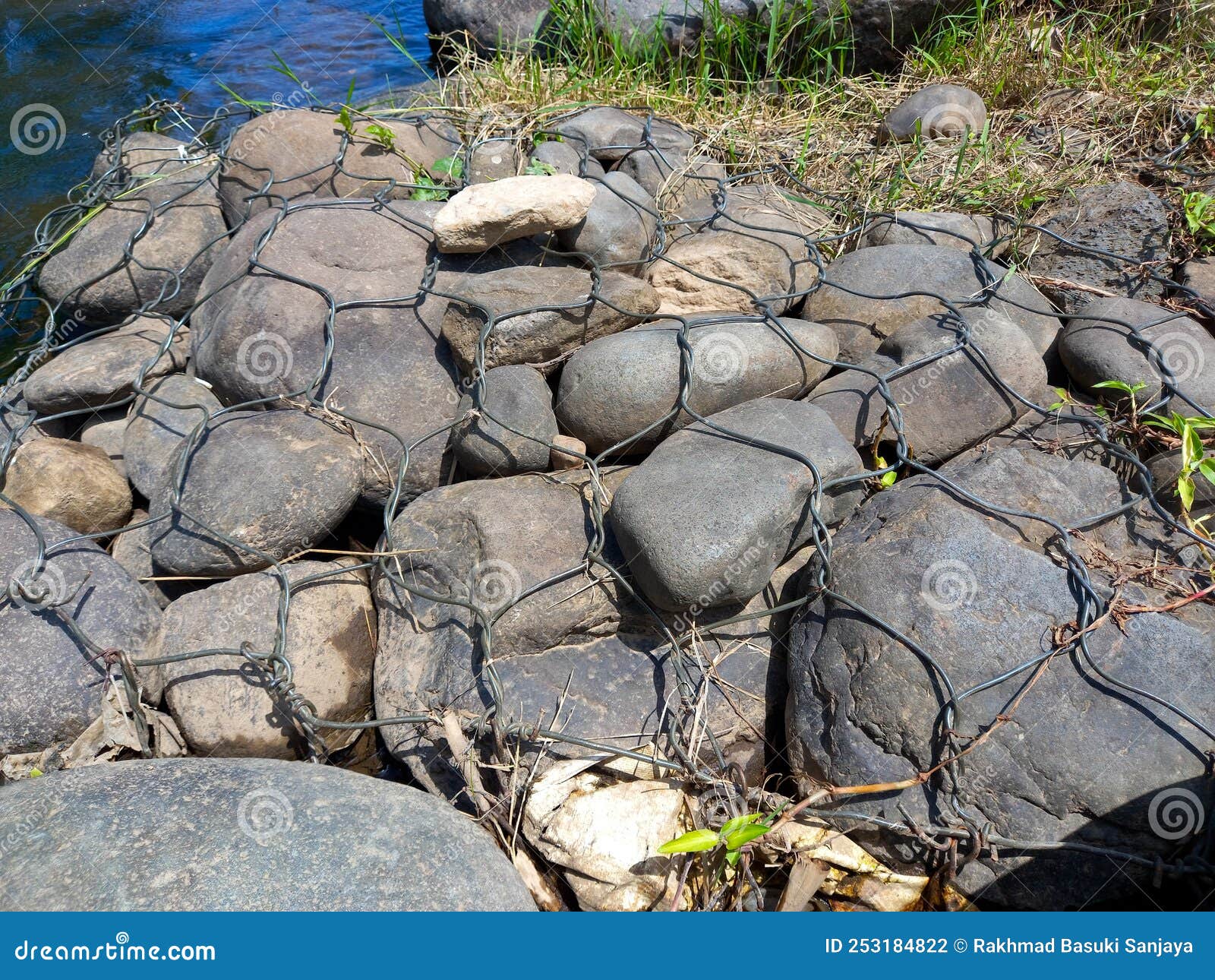A Gabion at River Side. Box Filled with Rocks Stock Photo - Image of ...