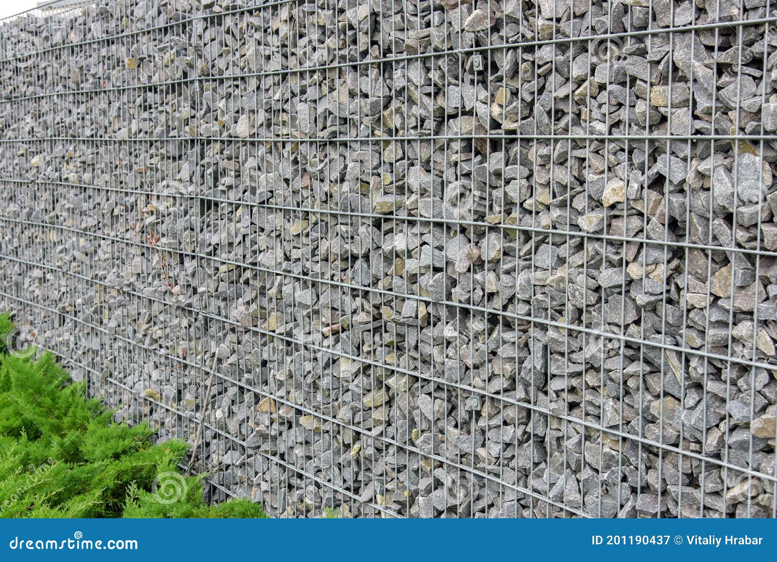 Gabion, A Stone Wall With A Metal Grid Of Gray Granite Texture Stock ...